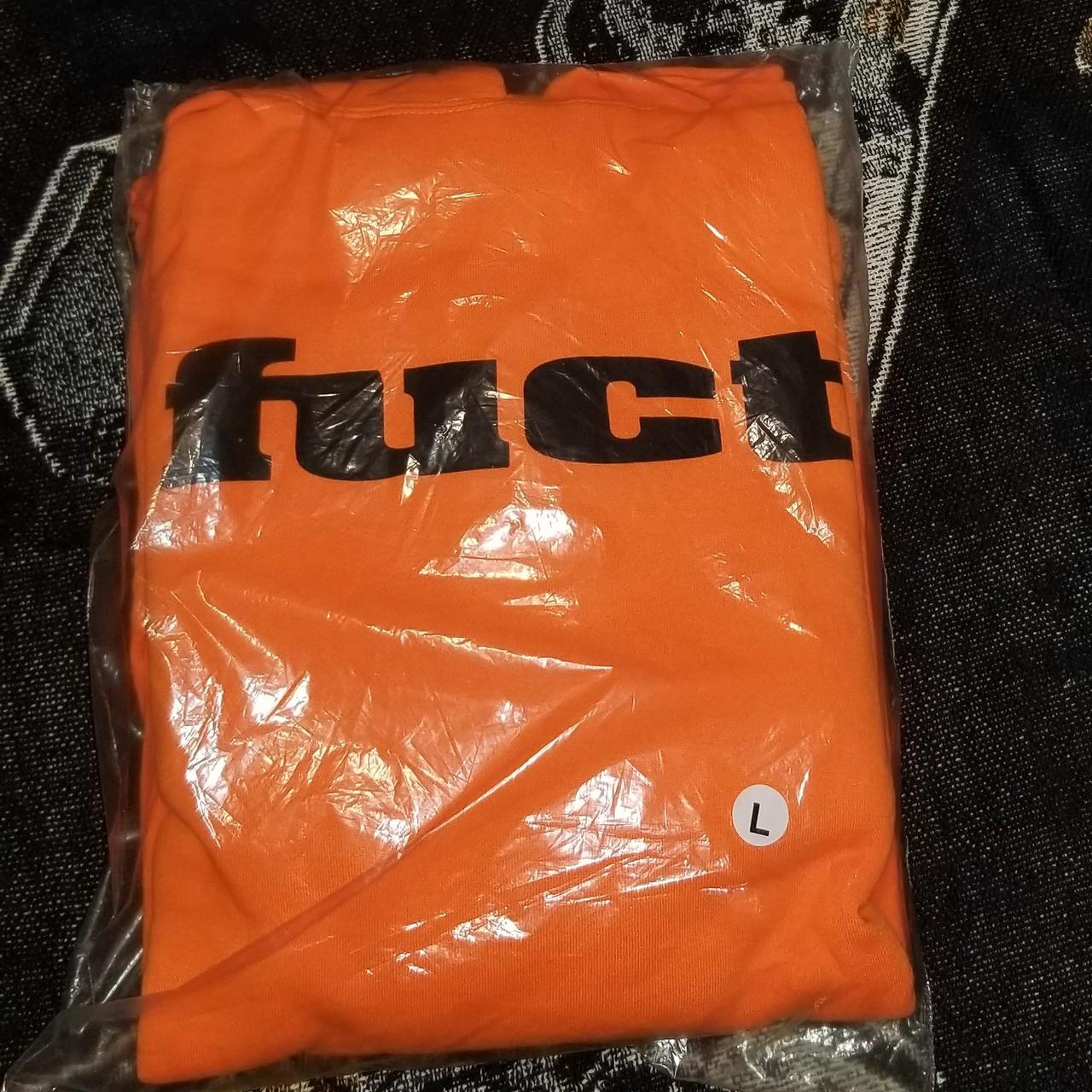 Fuct logo hoodie orange black. This hoodie was one... - Depop