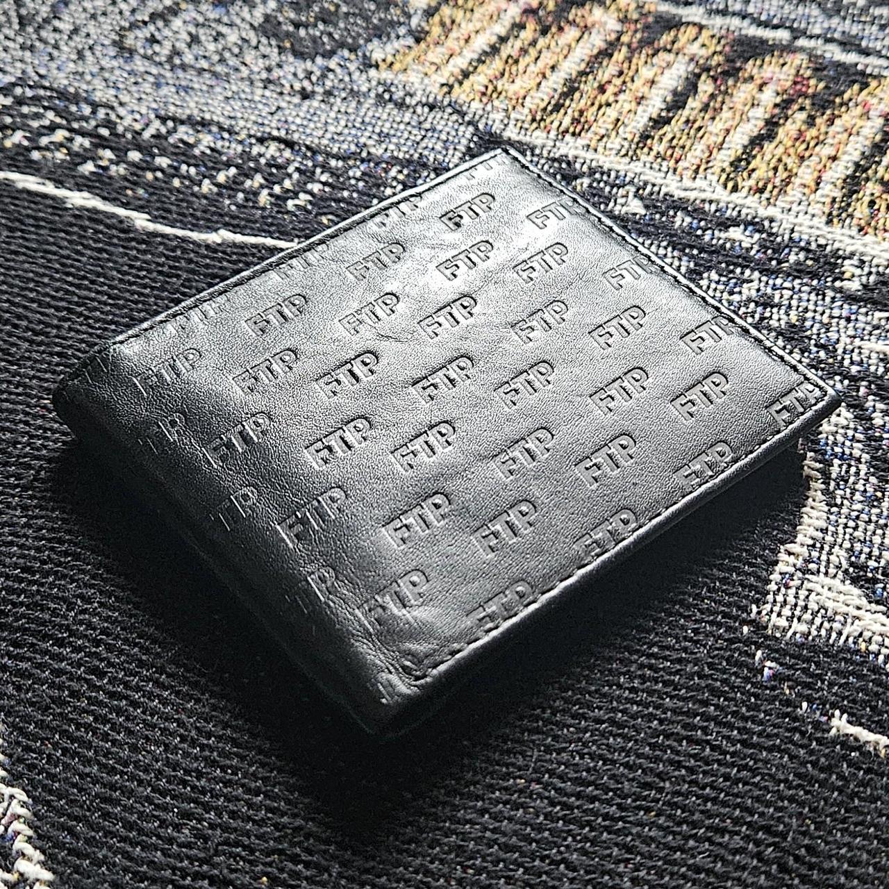 FTP allover debossed wallet. Rare to find in this... - Depop
