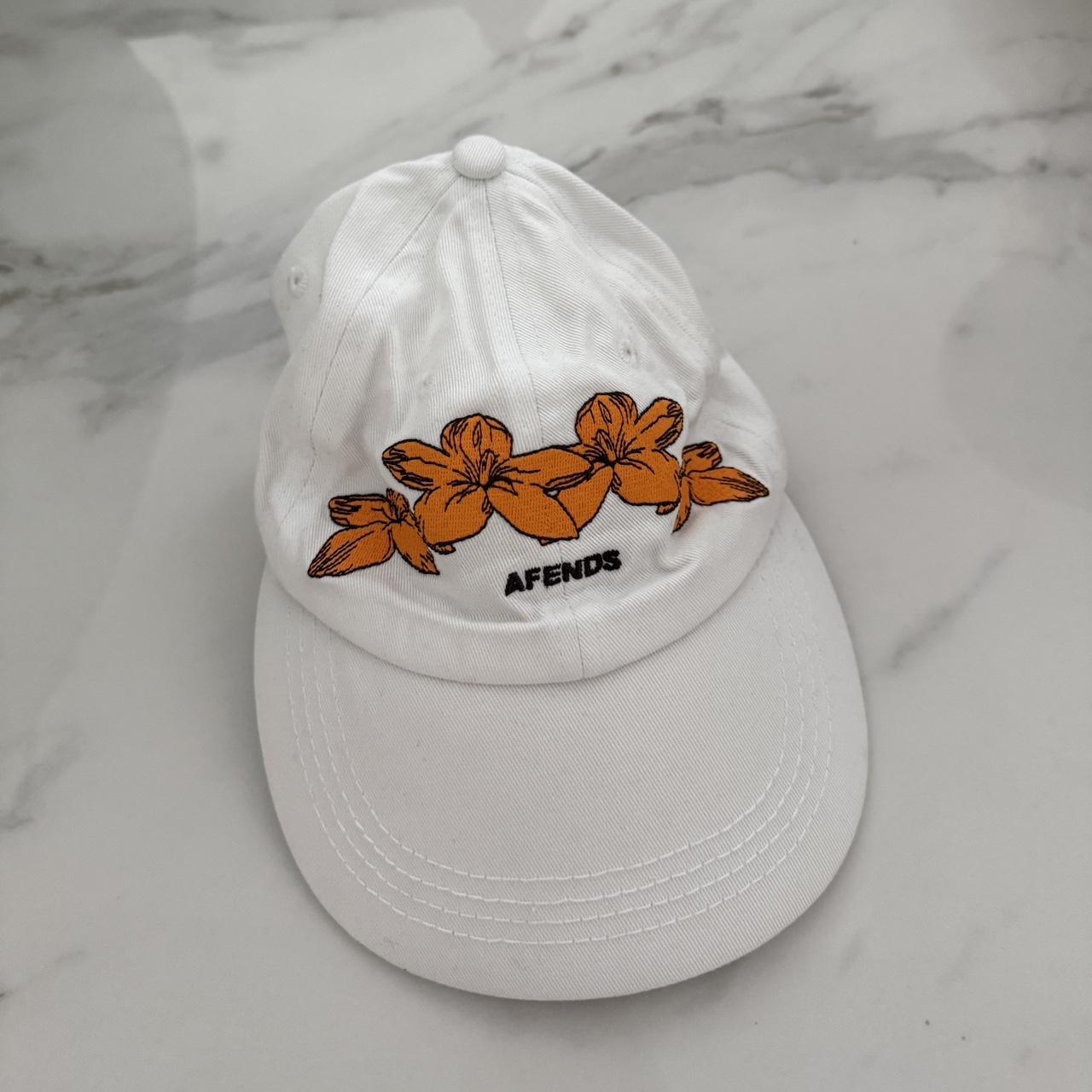 White AFENDS cap with orange floral embroidery.... - Depop