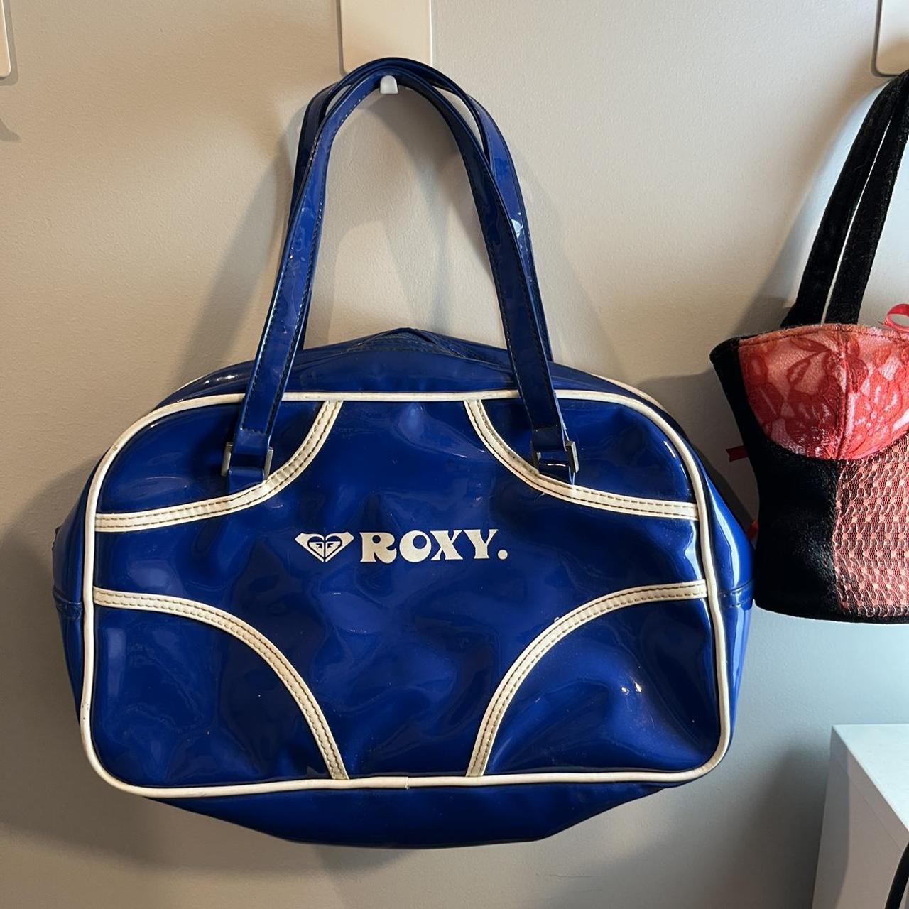 Stunning roxy bag! Incredible blue colour however... - Depop