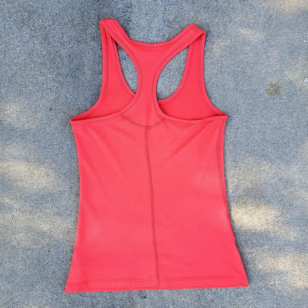 DRI FIT RACERBACK TANK TOP Bright coral/neon red... - Depop
