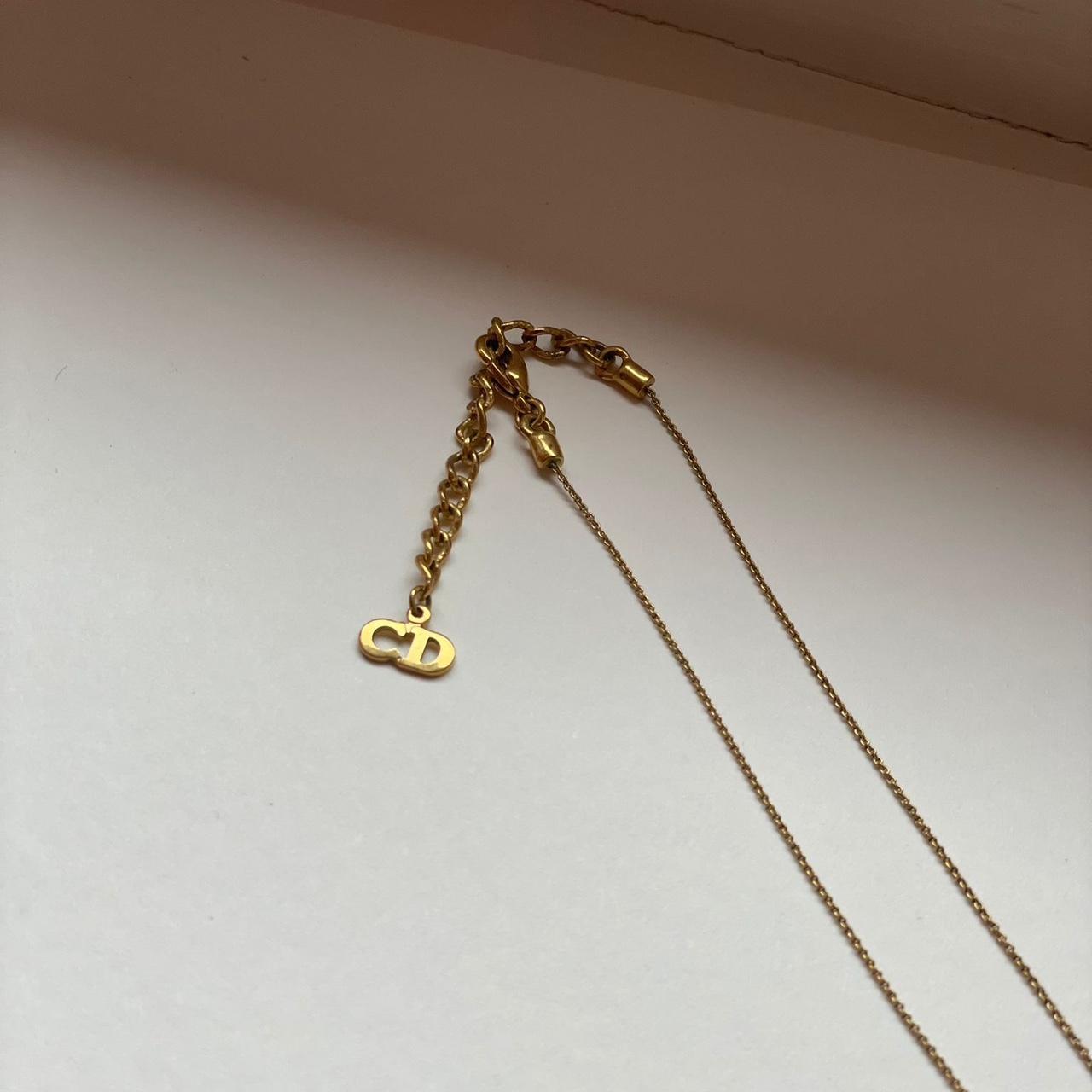 Authentic Christian Dior gold toned necklace with CD... - Depop