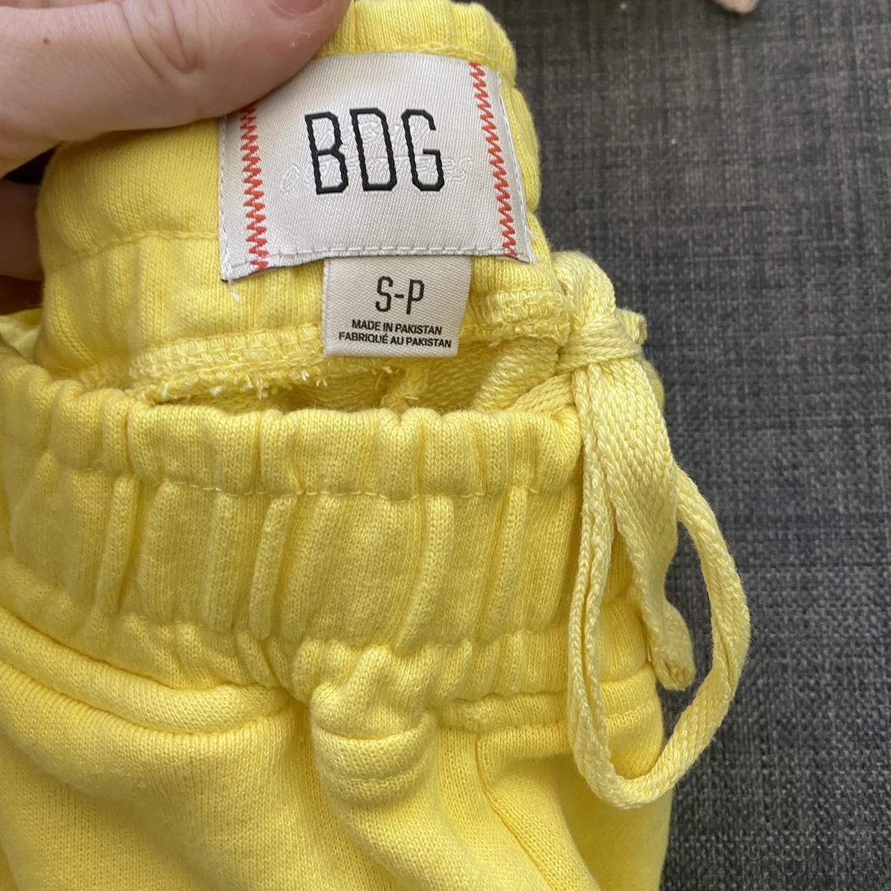 BDG Bonfire Cargo Sweatpant Yellow Snap pockets... - Depop