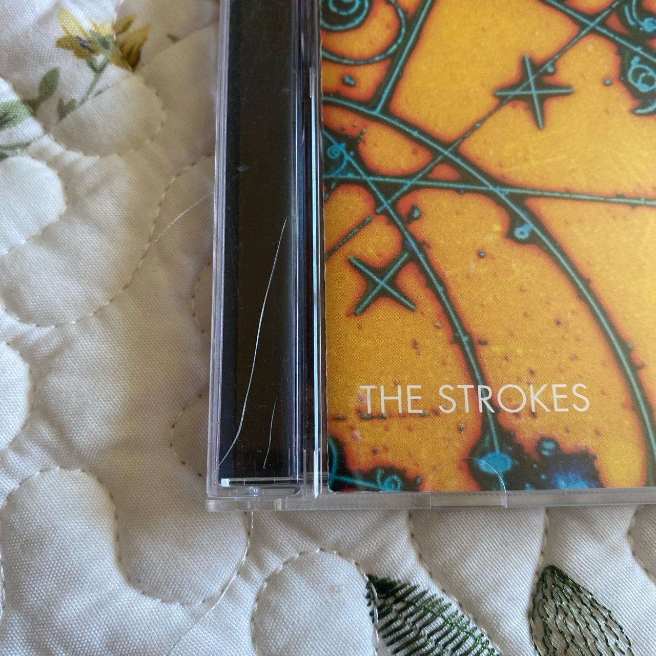 the strokes is this it cd theres a crack... - Depop