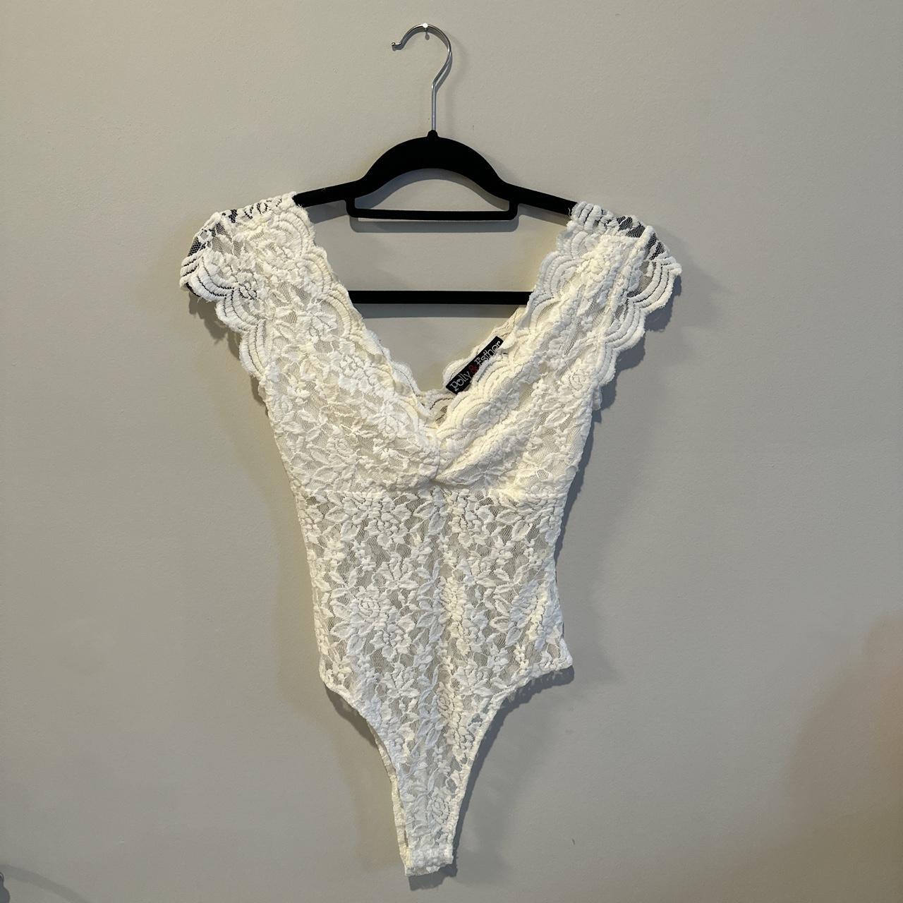 Never worn white lace bodysuit ! Size: Small Clasp... - Depop