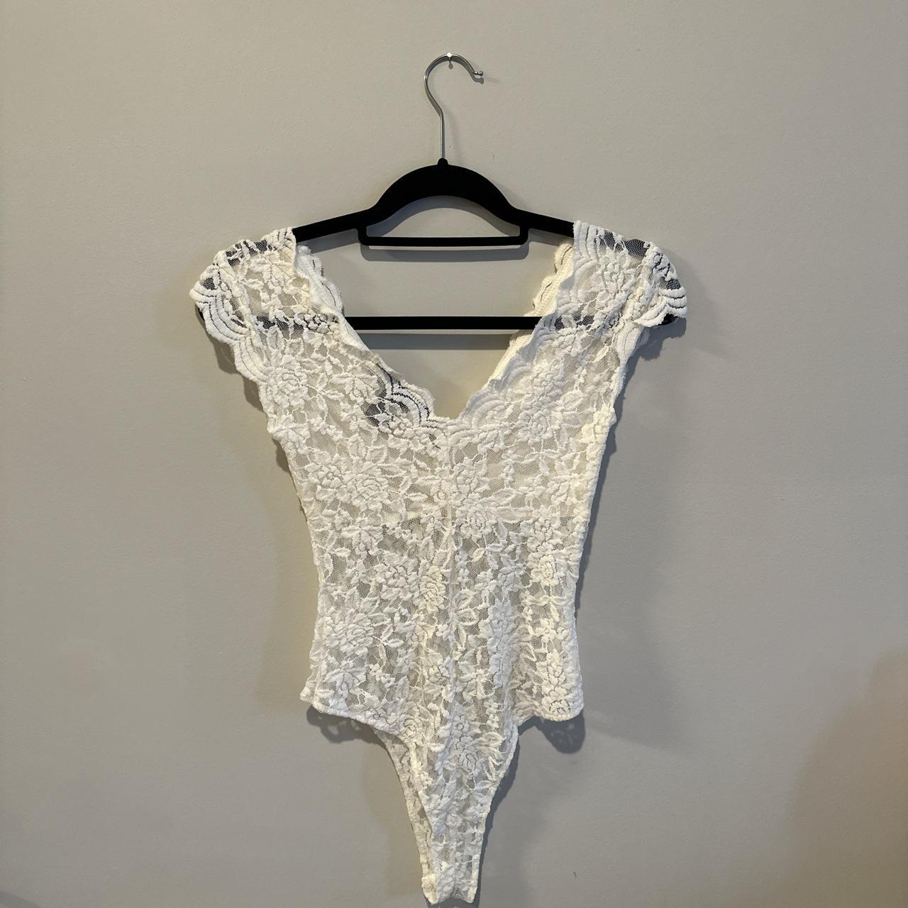 Never worn white lace bodysuit ! Size: Small Clasp... - Depop