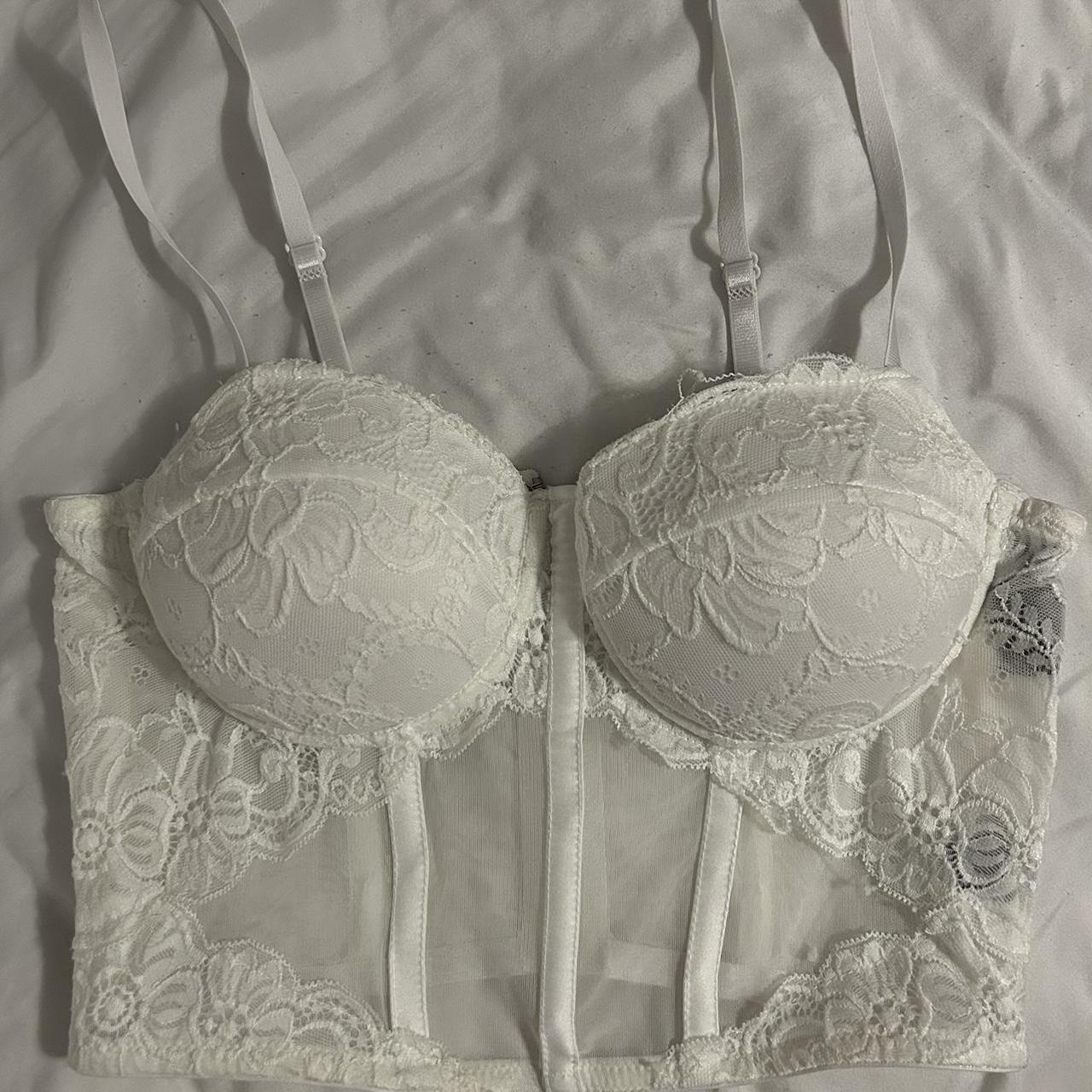 Very cute white lace corset top. Never worn, and In... | Depop