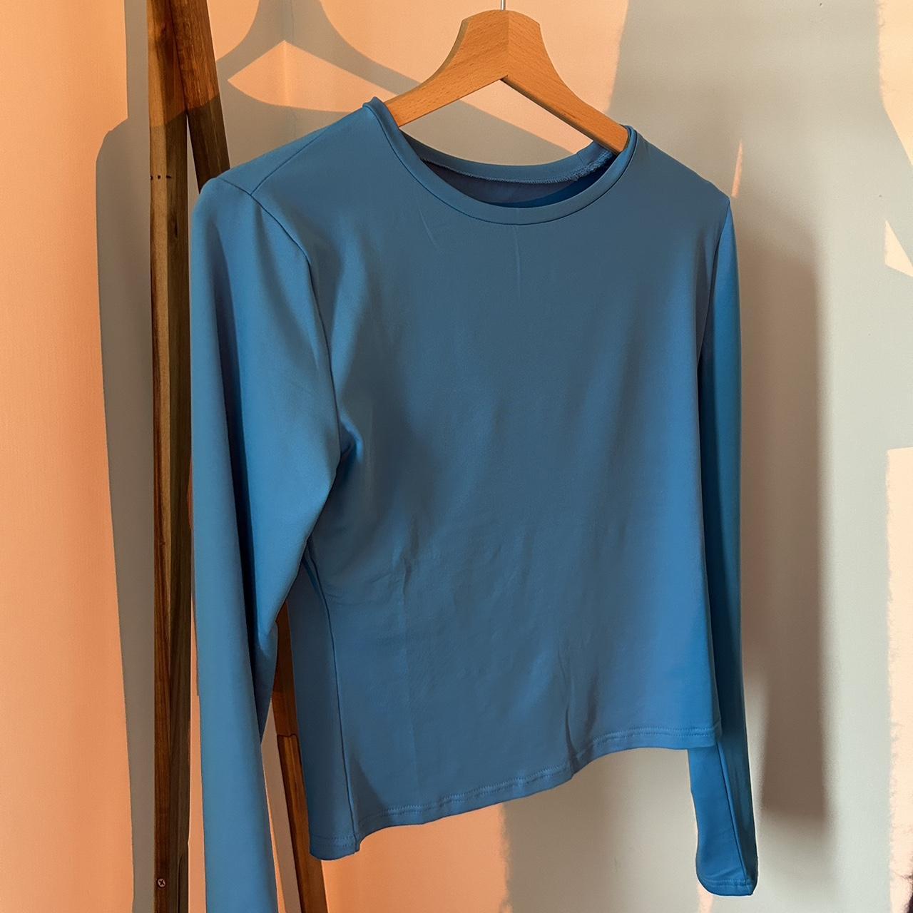 blue skim doop. long sleeve fitted top. Size Medium... - Depop