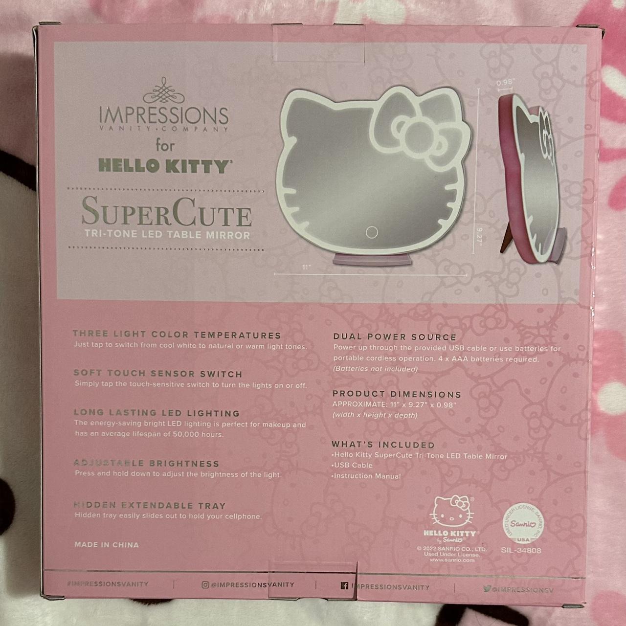 Hello Kitty table mirror in pink and grey... - Depop