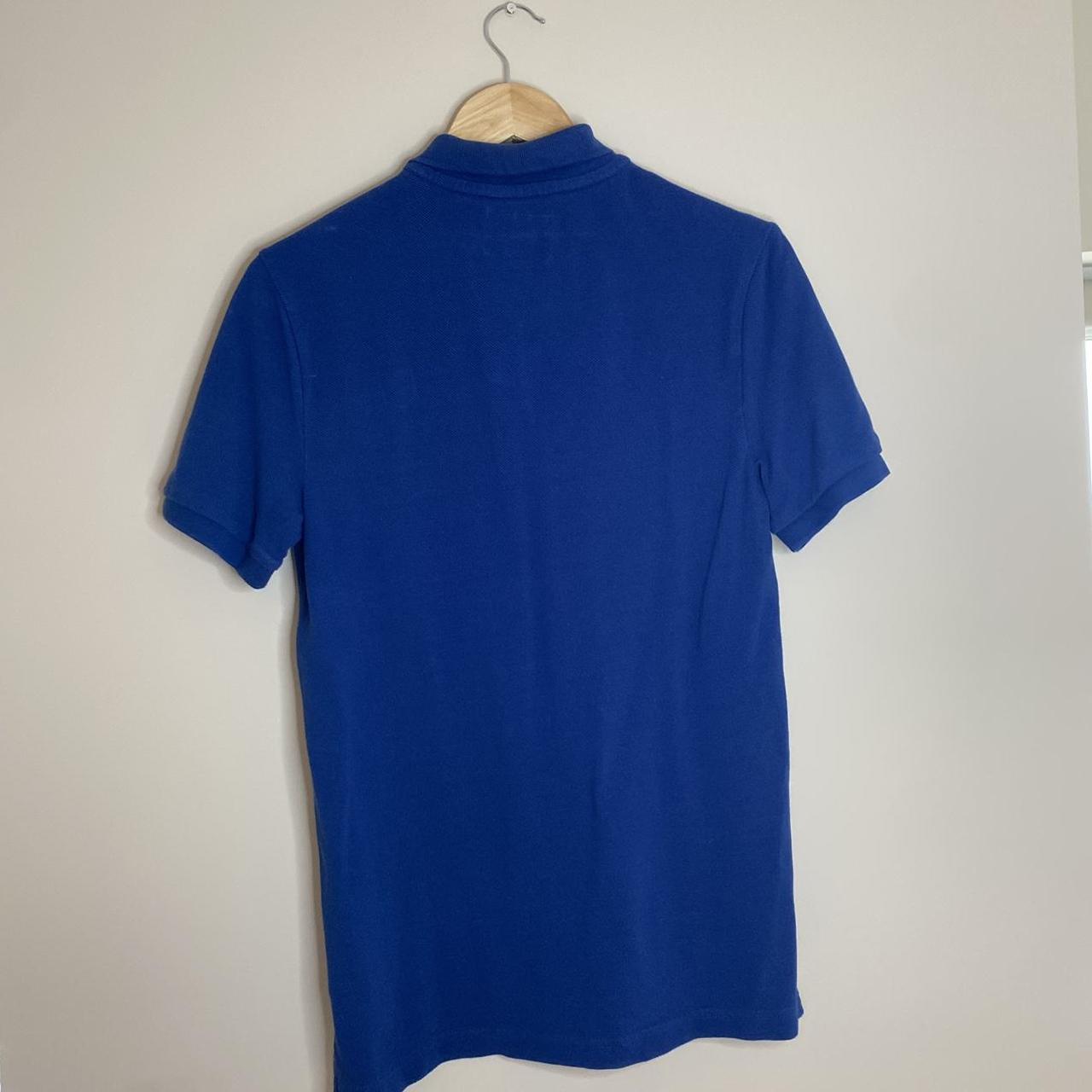 Roots polo shirt - Embroidered leather logo - Blue... - Depop