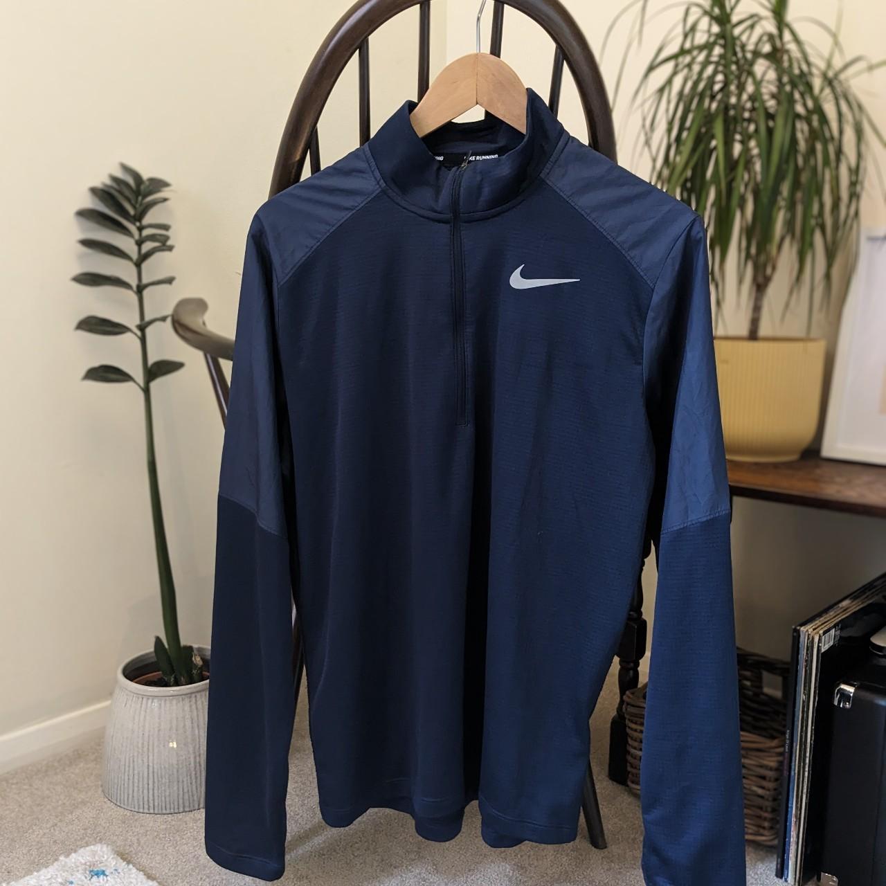 Navy long sleeved quarter zip pullover Nike Running... - Depop