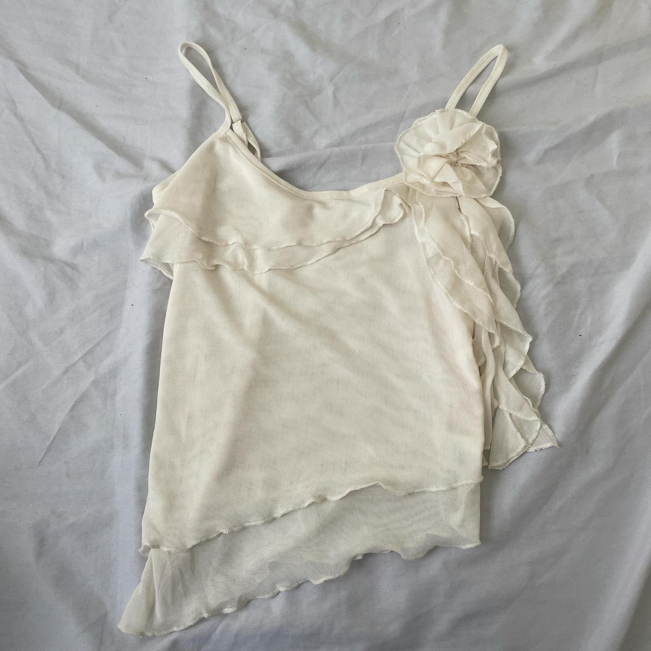 Cream tank top with flower - Depop