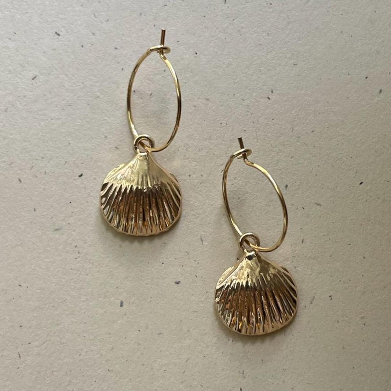 Gold shell hoops! Hoops are stainless steel! Hoops... - Depop