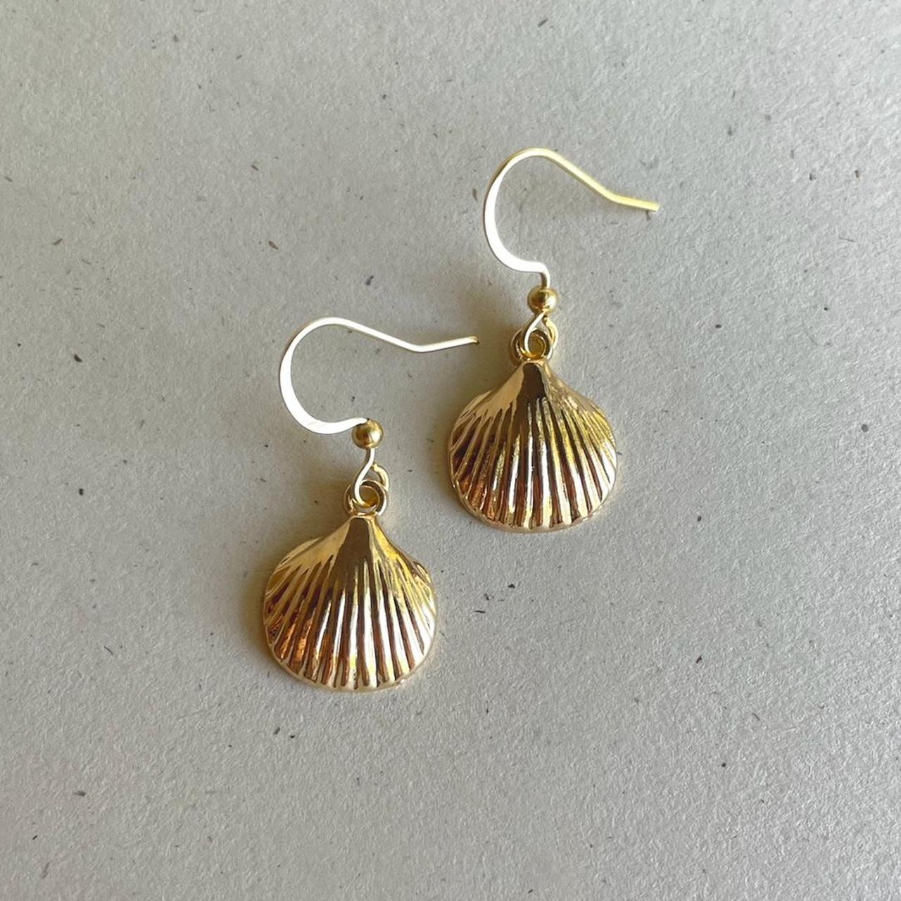 Gold shell dangle earrings! Hooks are stainless... - Depop