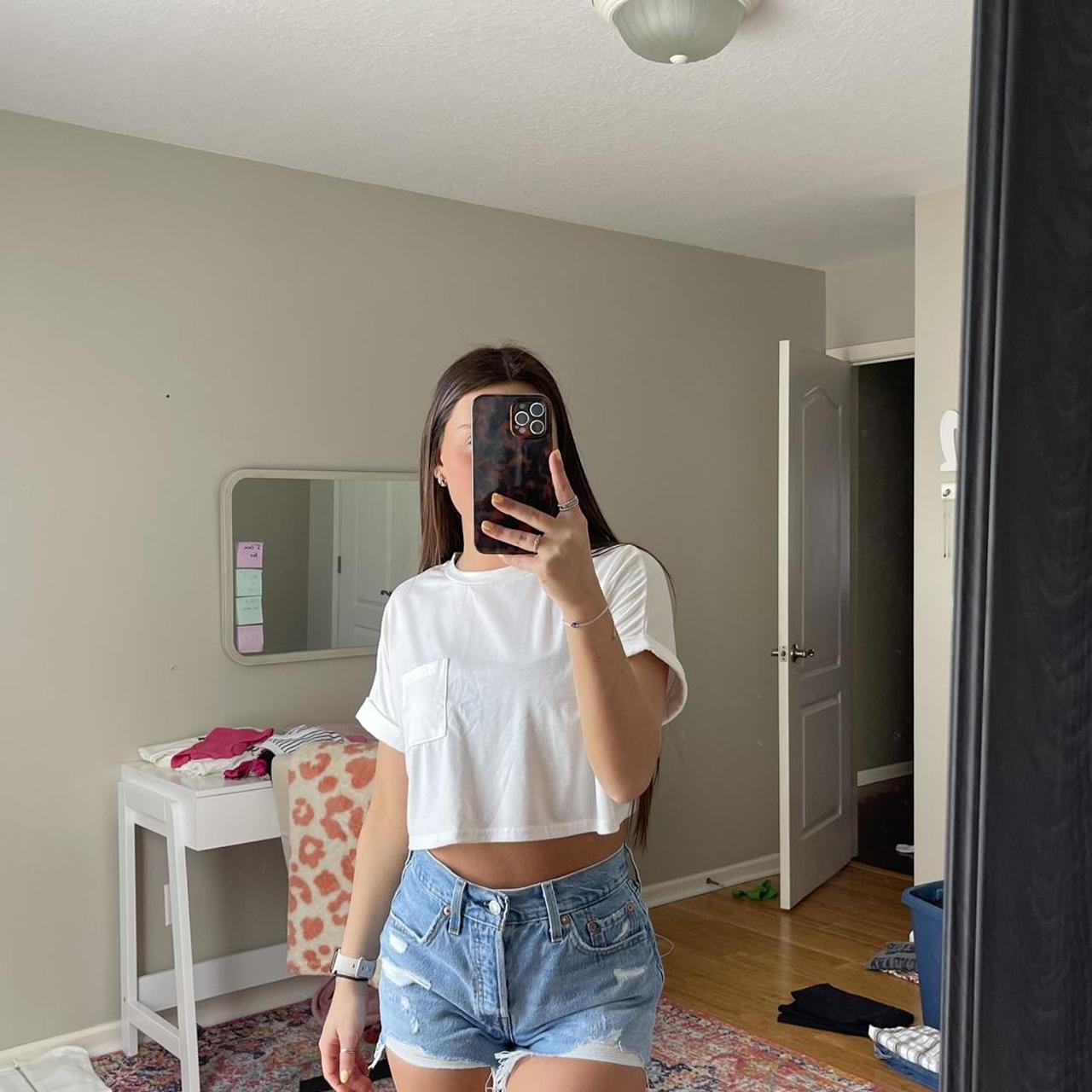 Cropped boxy fit top Fold over sleeves, left pocket... | Depop