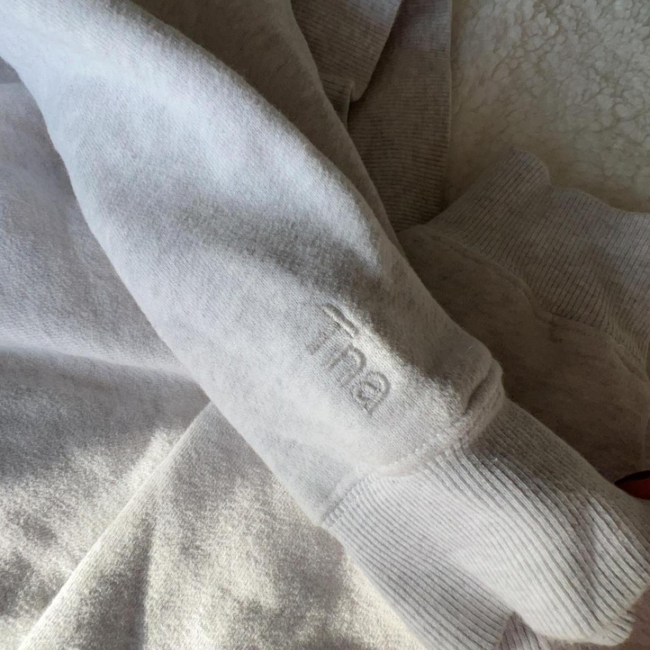 Cropped light grey quarter zip aritzia TNA jacket.... - Depop