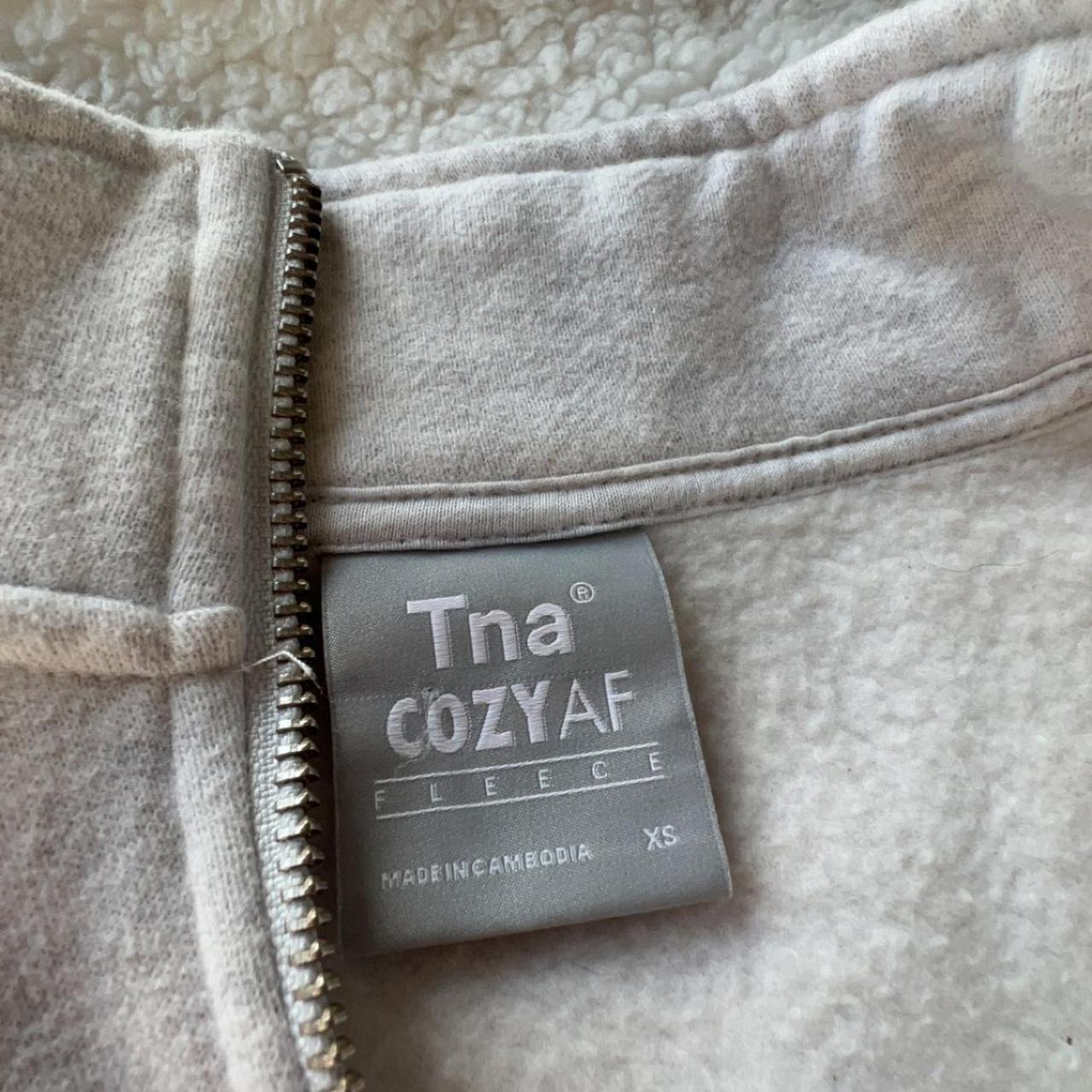 Cropped light grey quarter zip aritzia TNA jacket.... - Depop