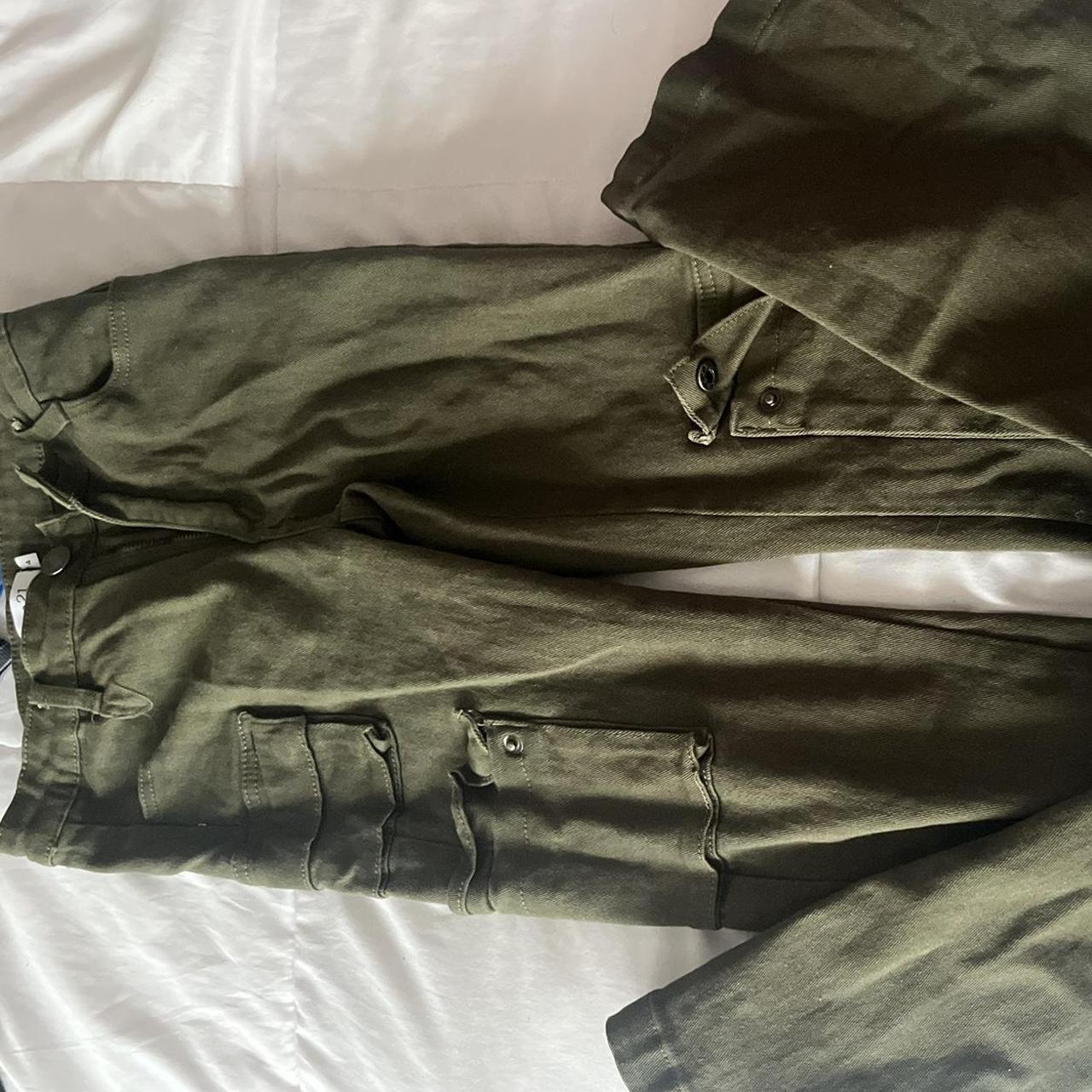 Rue 21 Khaki cargo pants with slight flare at the... | Depop
