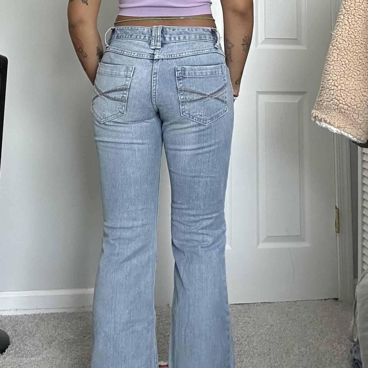 light blue flared/bootcut low rise jeans. size... - Depop