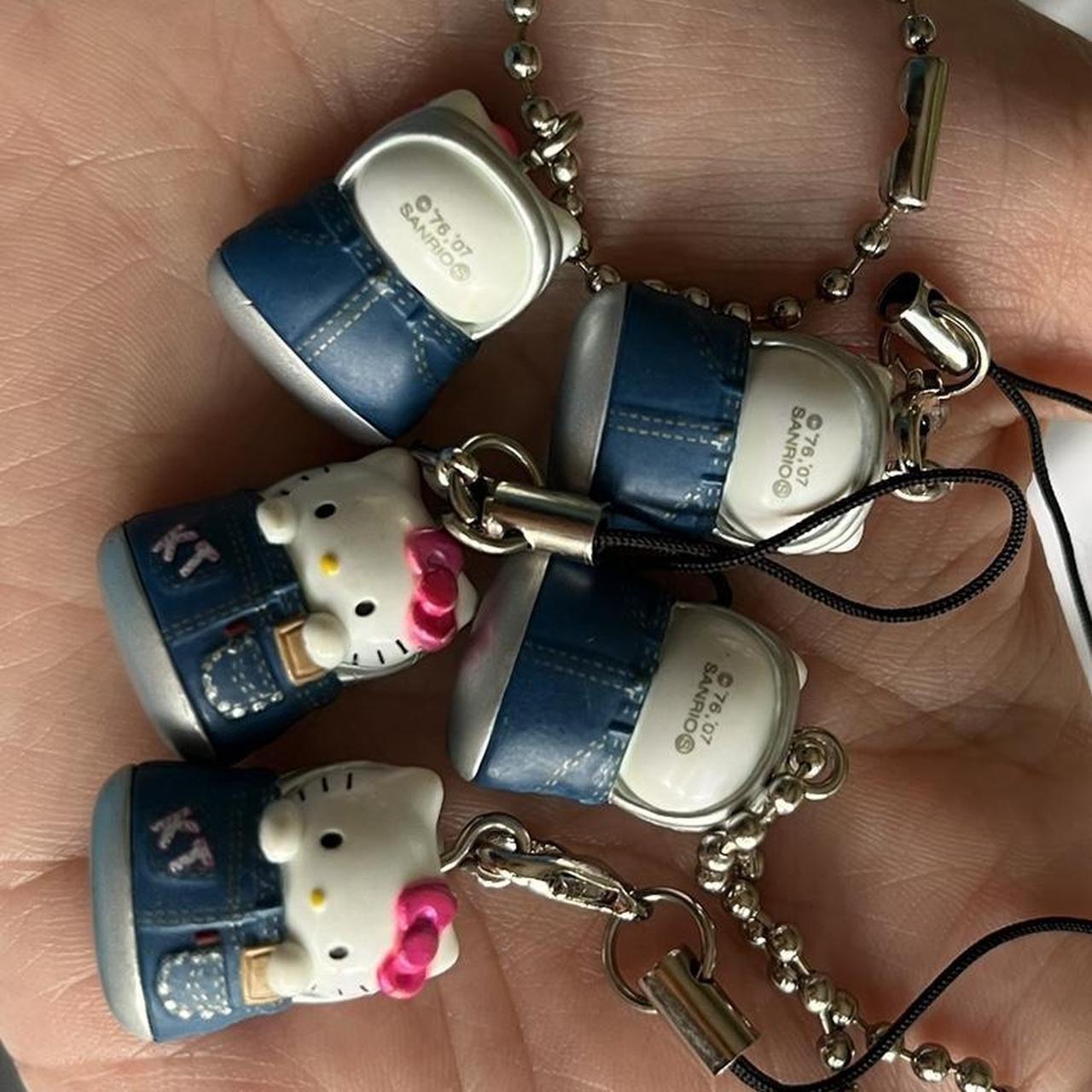 Hello kitty phone charm sitting in a cute denim bag,... - Depop