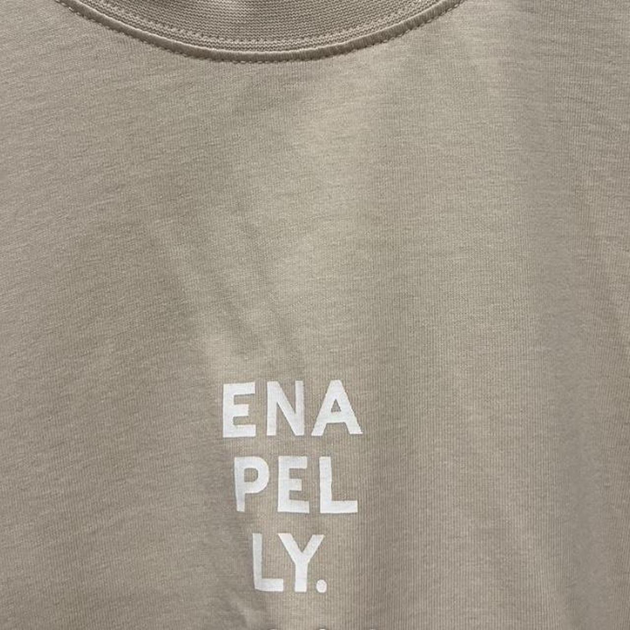 Ena Pelly Muscle Tshirt. Like neutral colour, with... - Depop