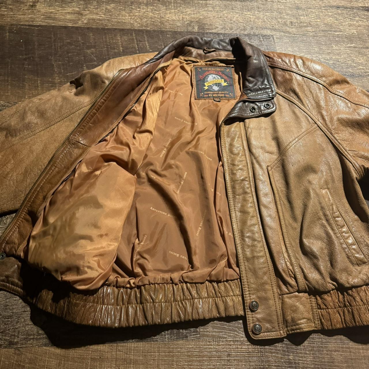 Yellowish brown leather bomber jacket with a worn... - Depop