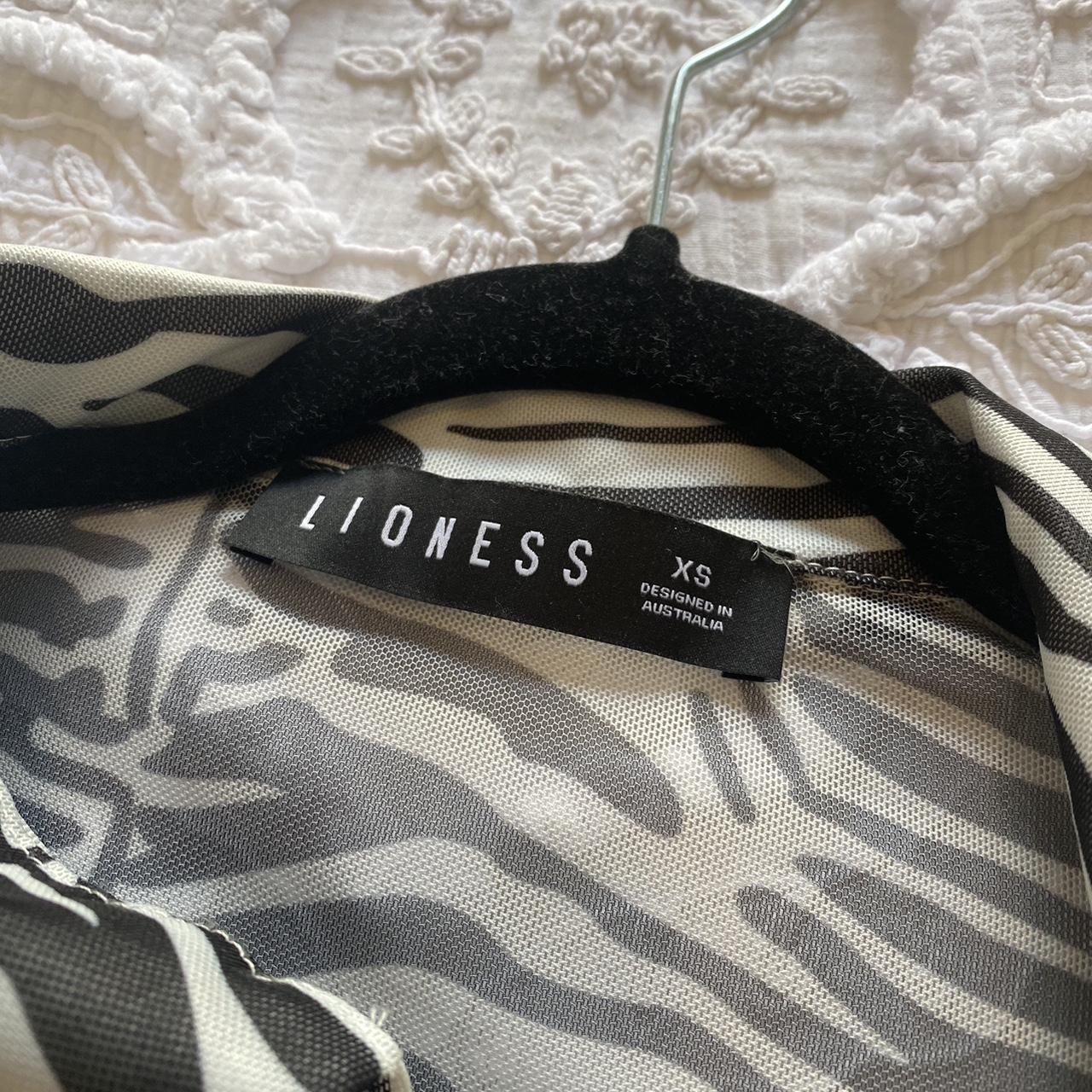 Lioness zebra long sleeve top Slightly sheer Never... - Depop