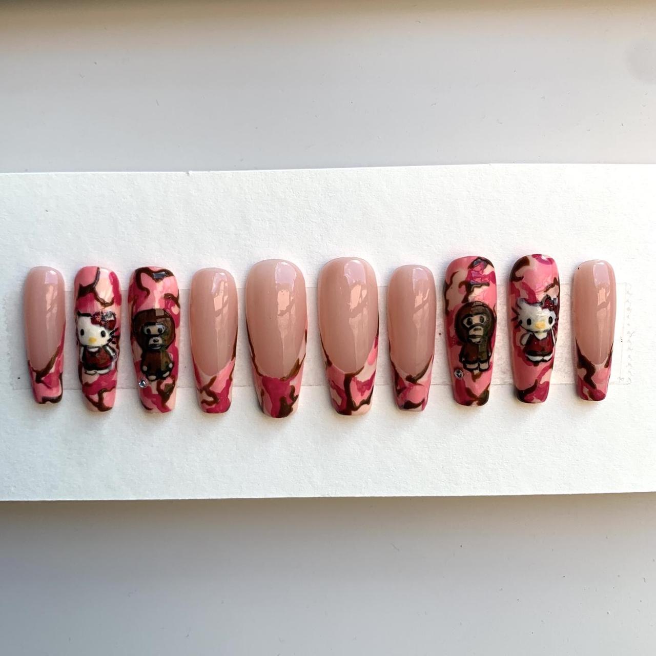 Bape x Hello Kitty pink camo inspired nails size... - Depop