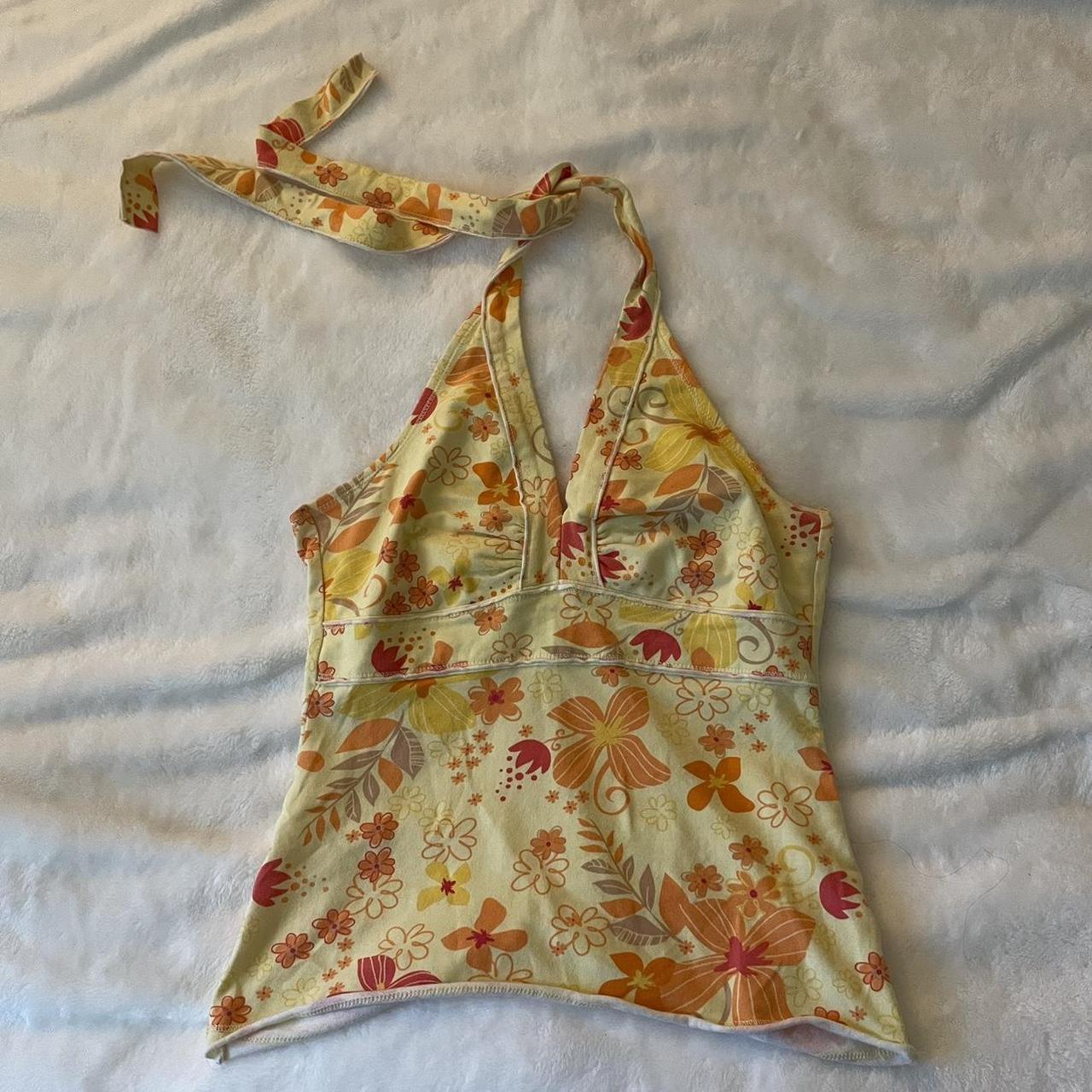 Yellow floral halter top fits a small medium - Depop