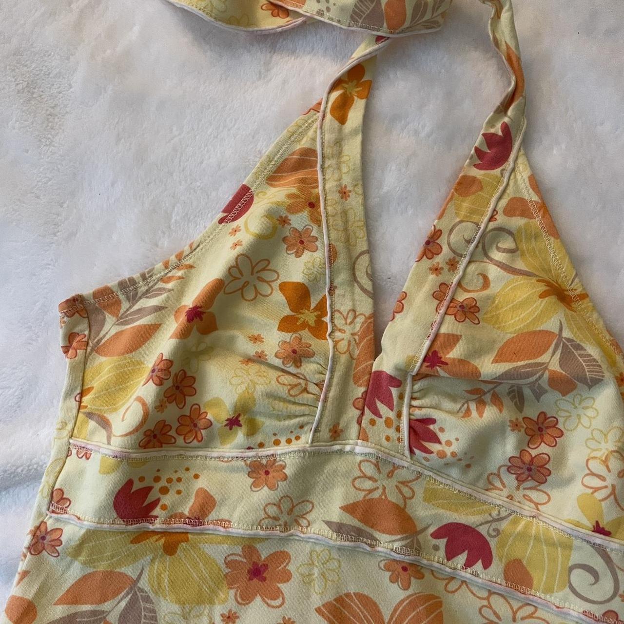 Yellow floral halter top fits a small medium - Depop