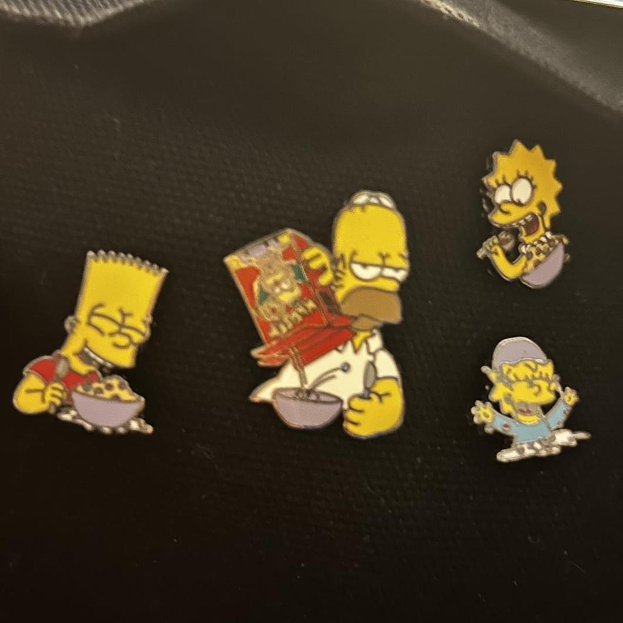 The Simpsons Universal Studios enamel pin... - Depop