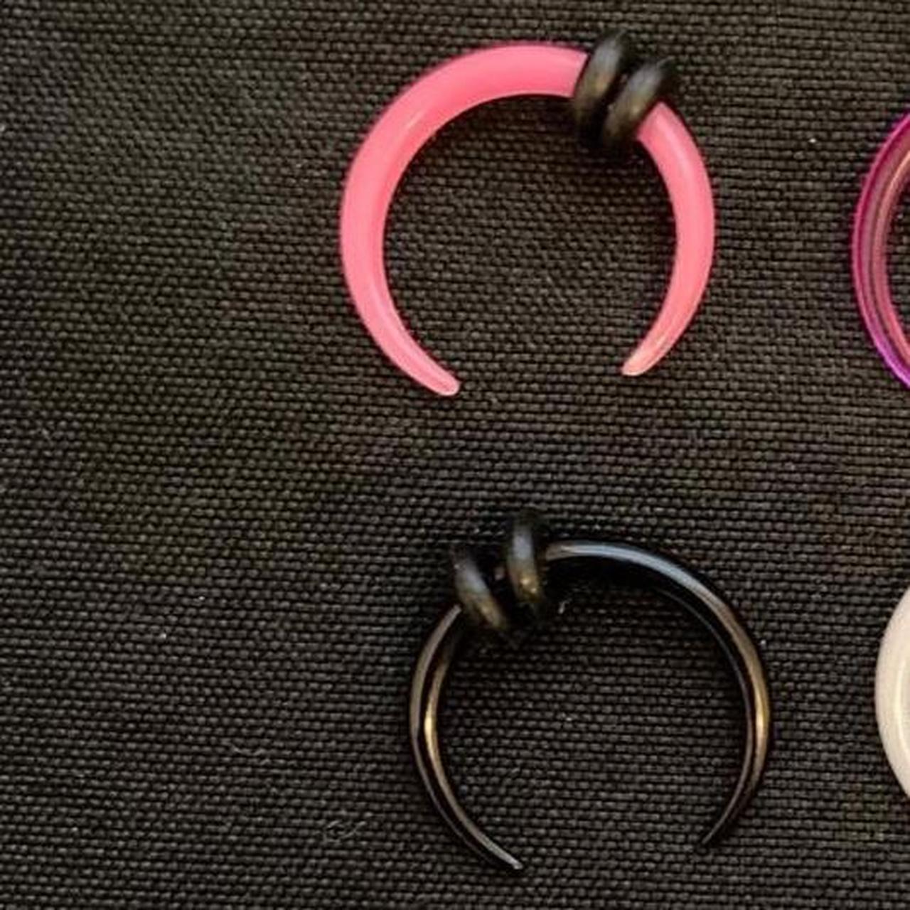 Black 12g and pink 14g septum pincher for @g0thdarnit - Depop