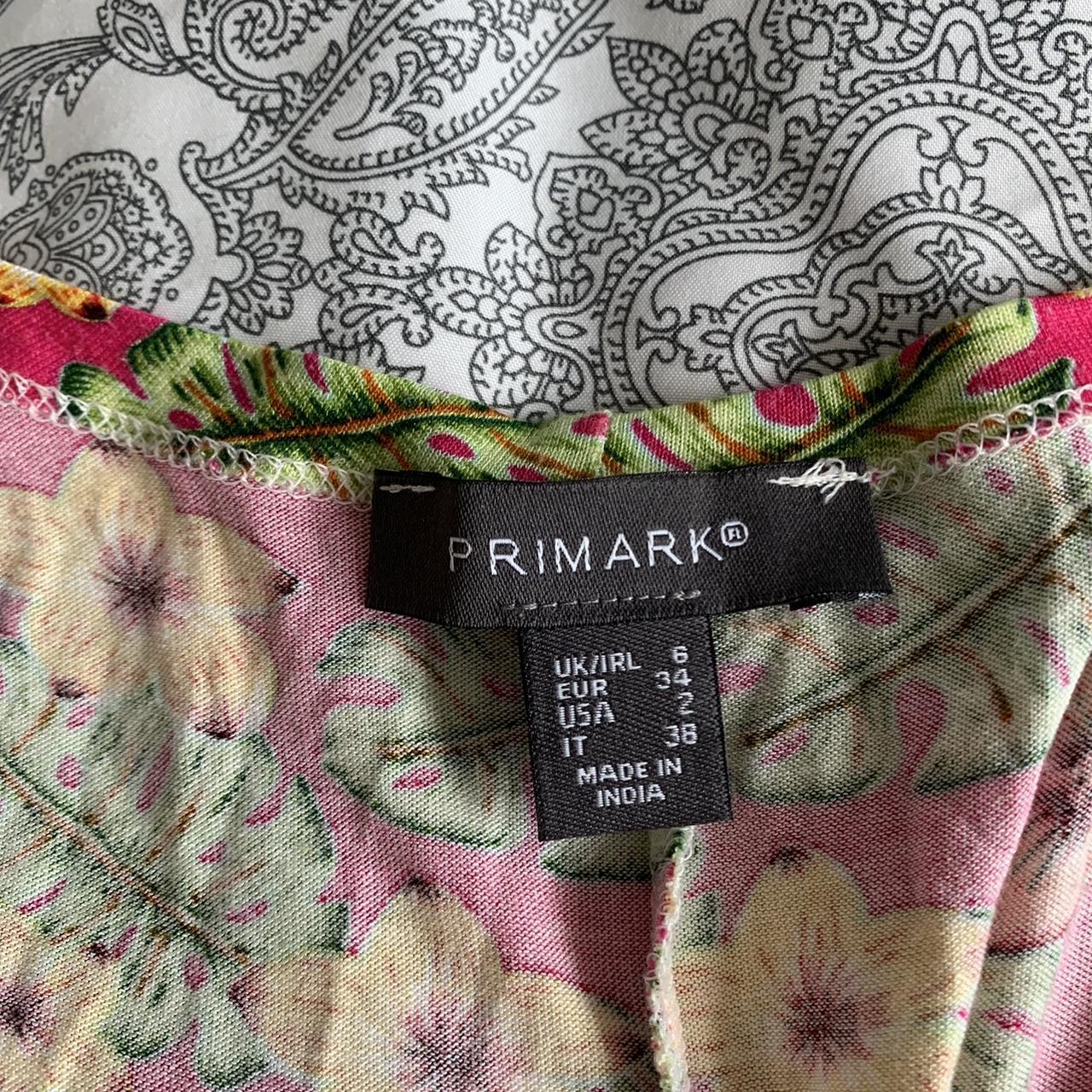 Primary flowery / flower pattern shorts playsuit V... - Depop