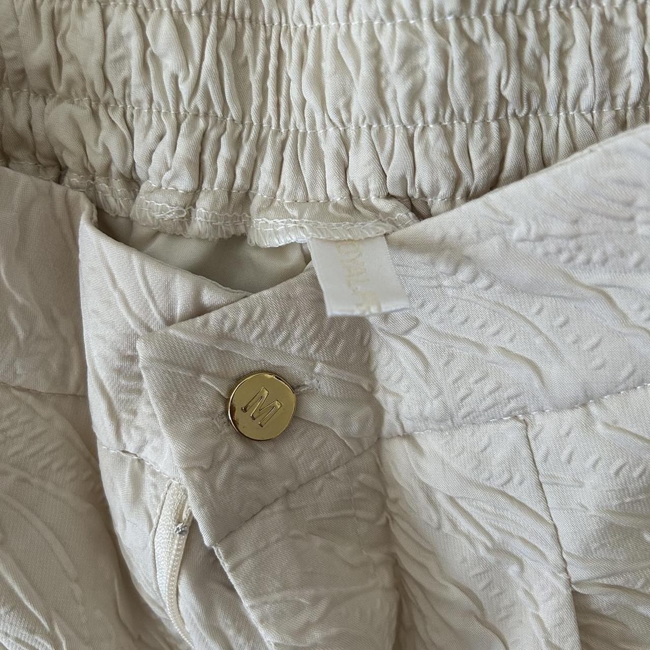 The Unbranded Brand Women's Cream and Gold Shorts | Depop