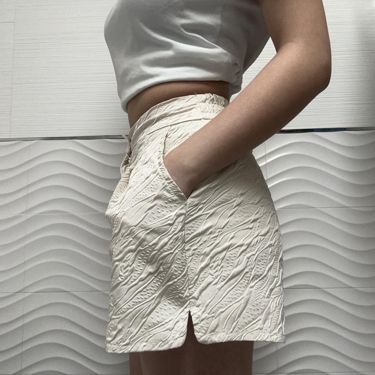 The Unbranded Brand Women's Cream and Gold Shorts | Depop