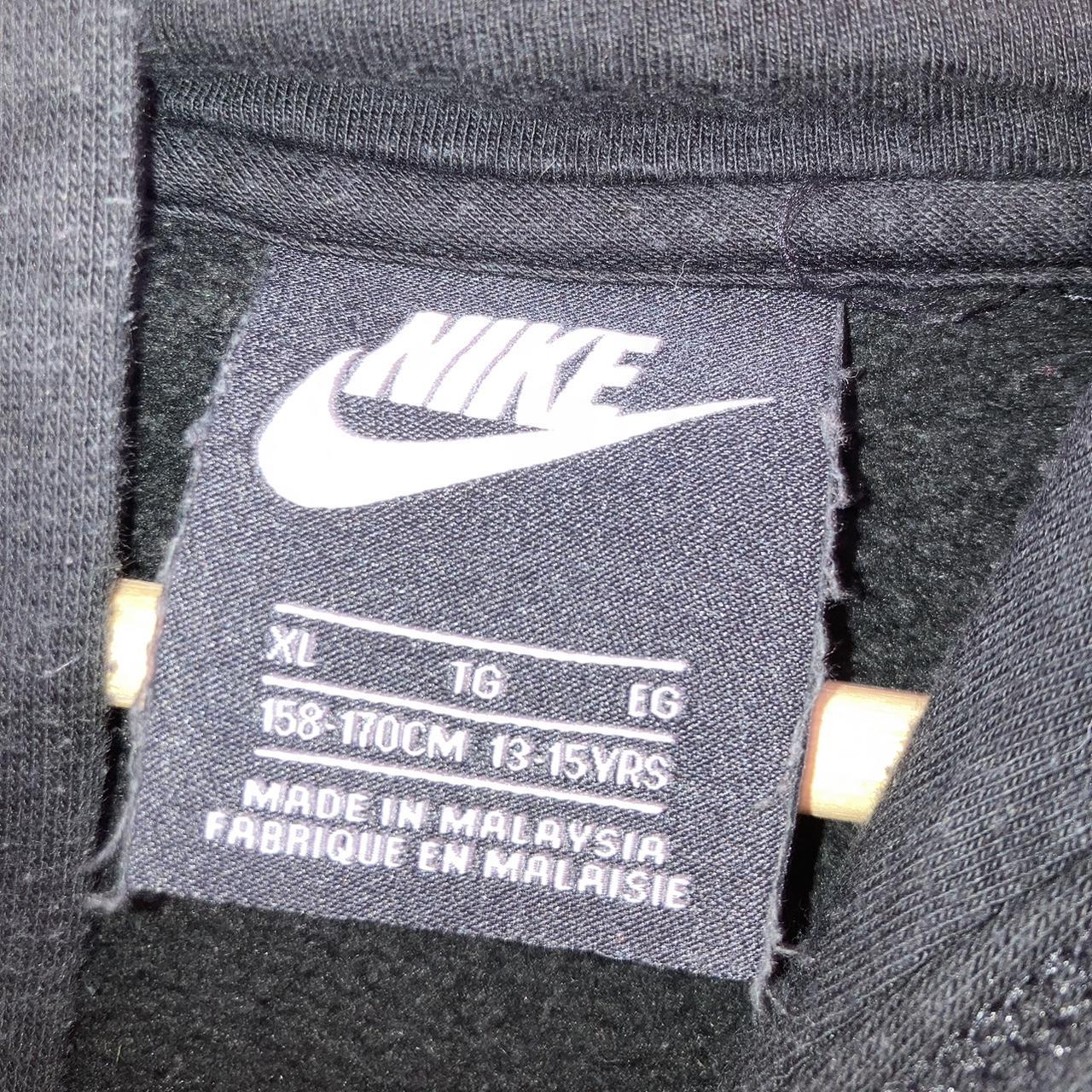 Kids XL Nike hoodie in black would fit women sized... - Depop