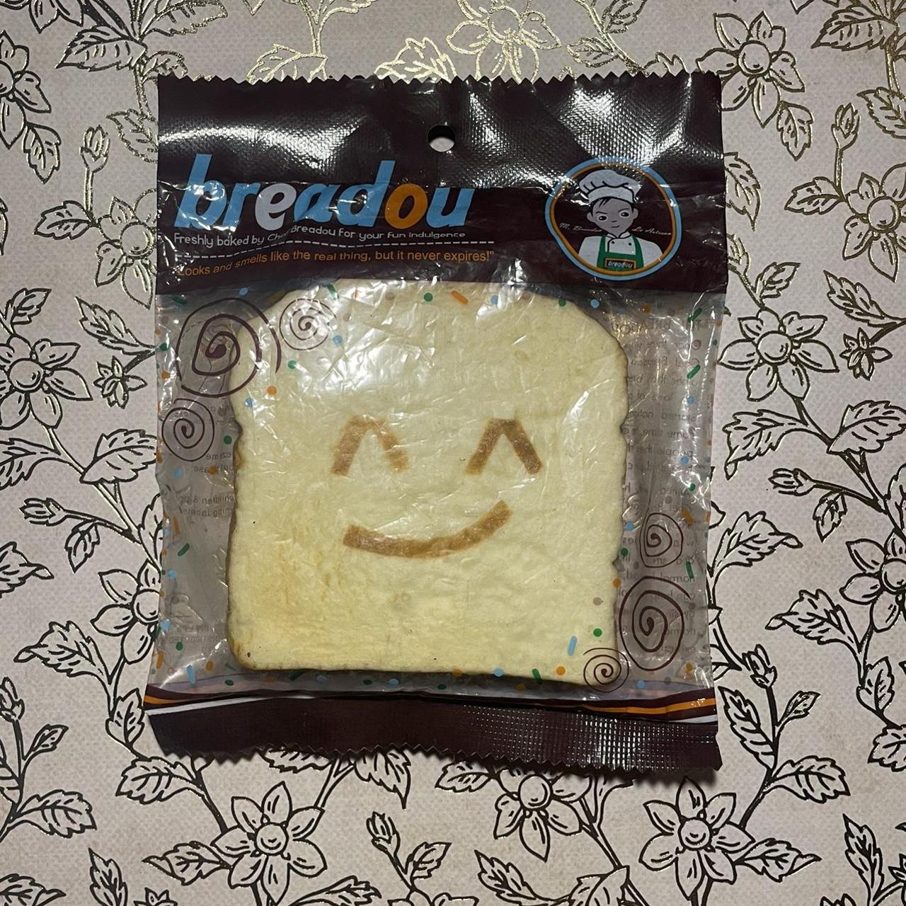 Breadou Toast Slice Squishy with a cute face! - in... - Depop