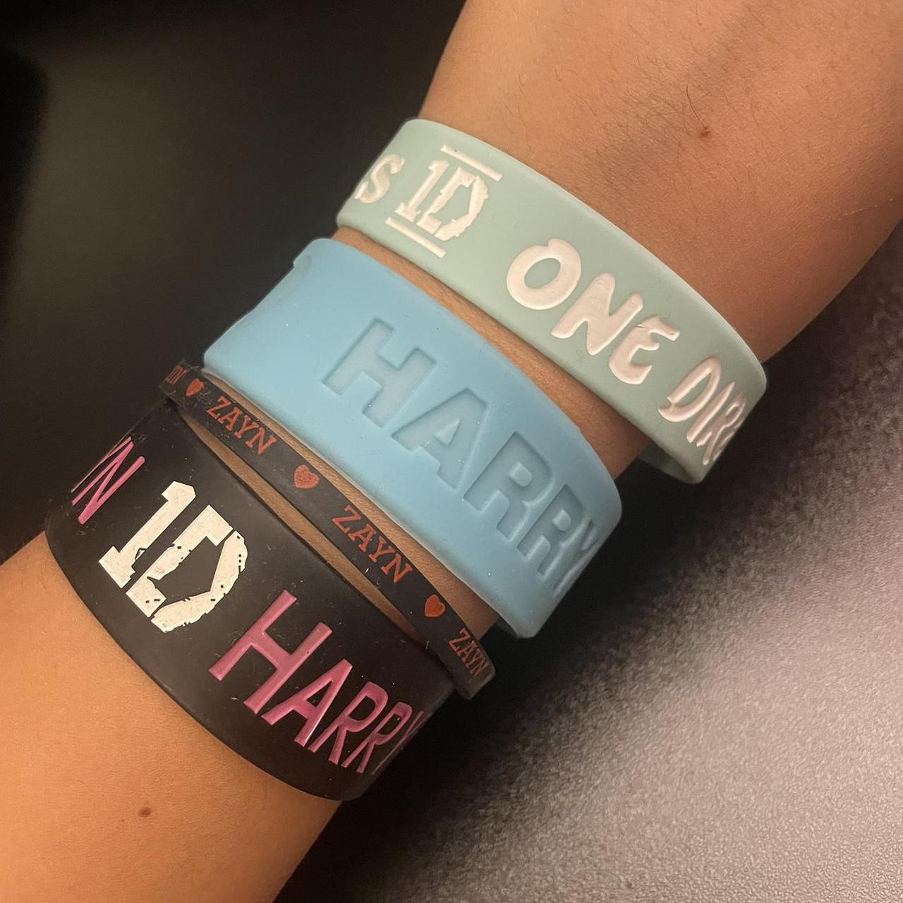 4 pack one direction rubber bracelets •3 thick ones... - Depop