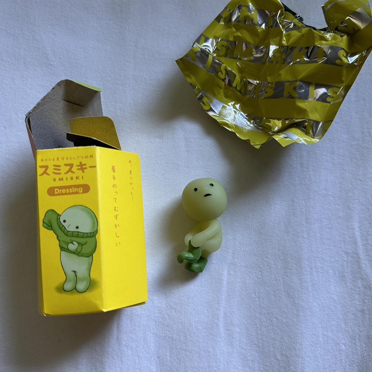 smiski dressing series: smiski putting on socks 🧦... - Depop