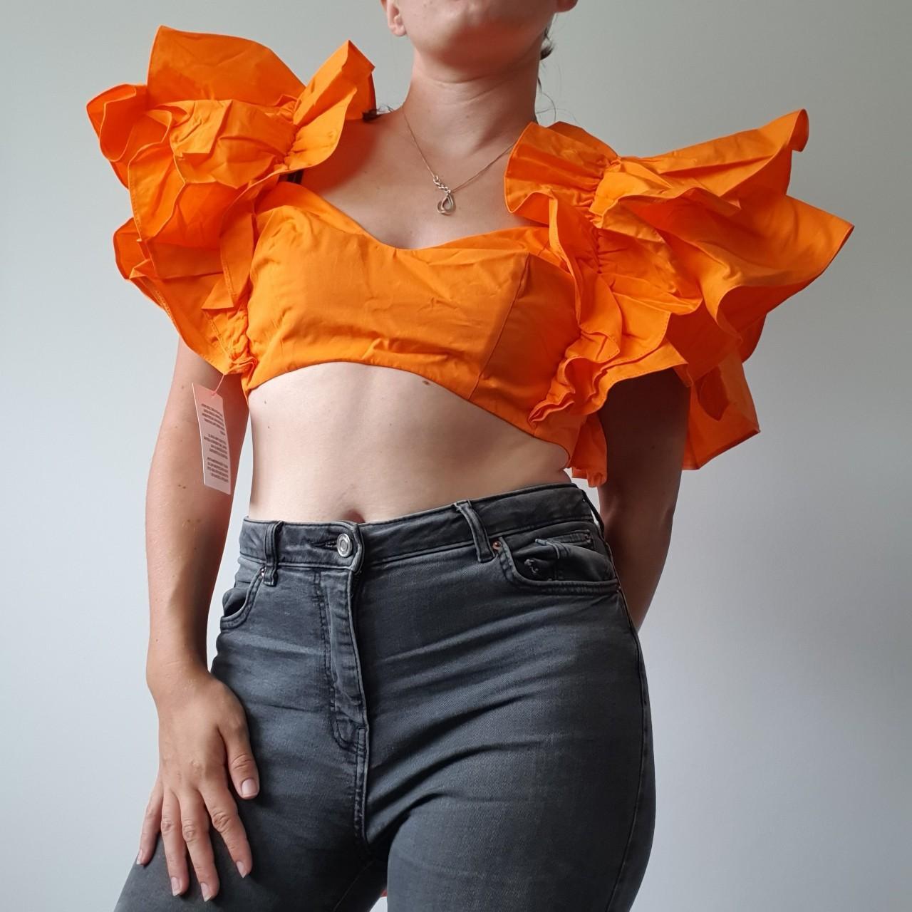 Orange ruffle sleeve bow tie back cropped... - Depop
