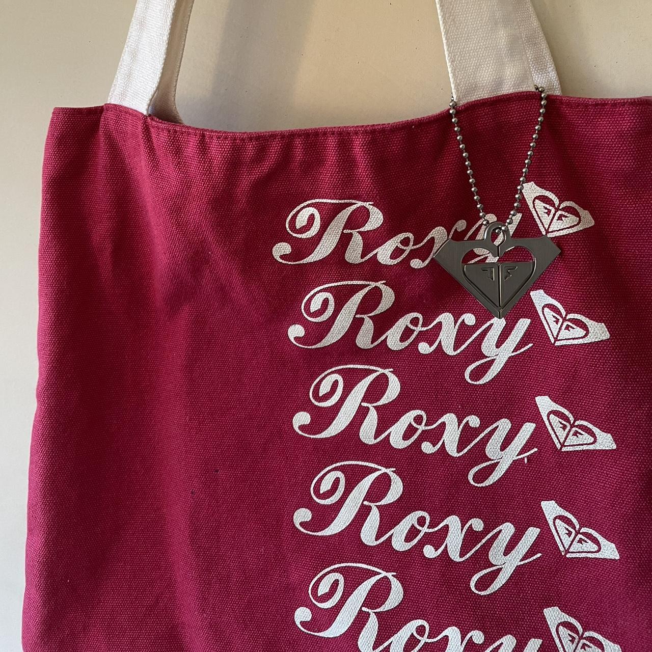 Small red Roxy tote bag with cream straps and... - Depop