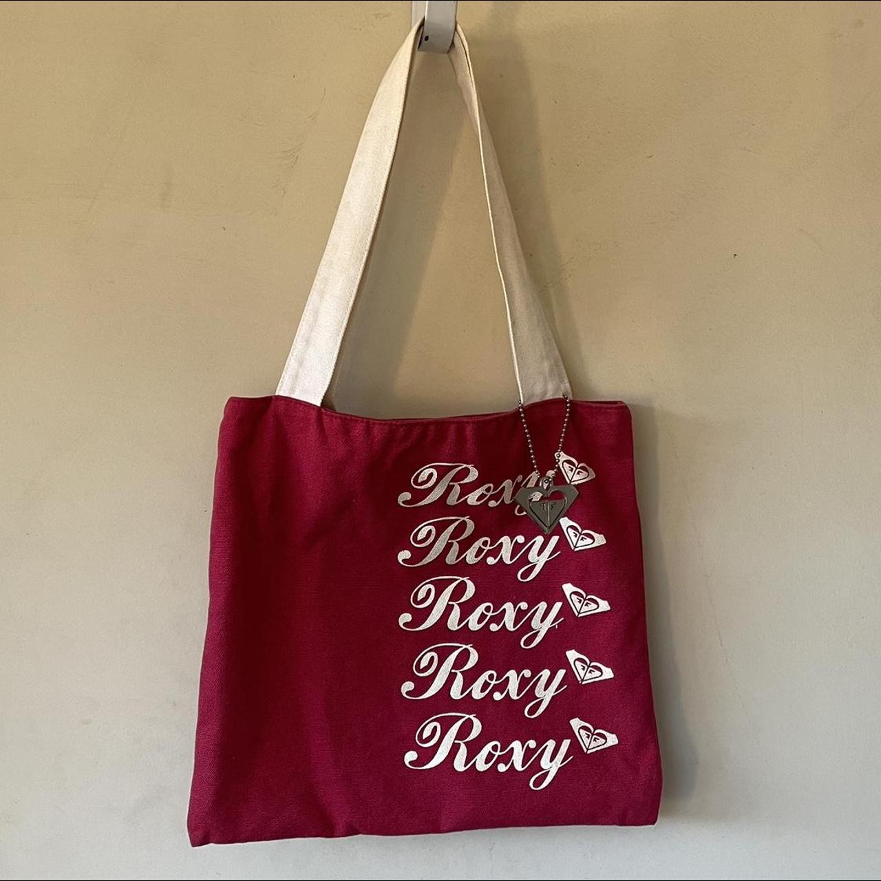 Small red Roxy tote bag with cream straps and... - Depop