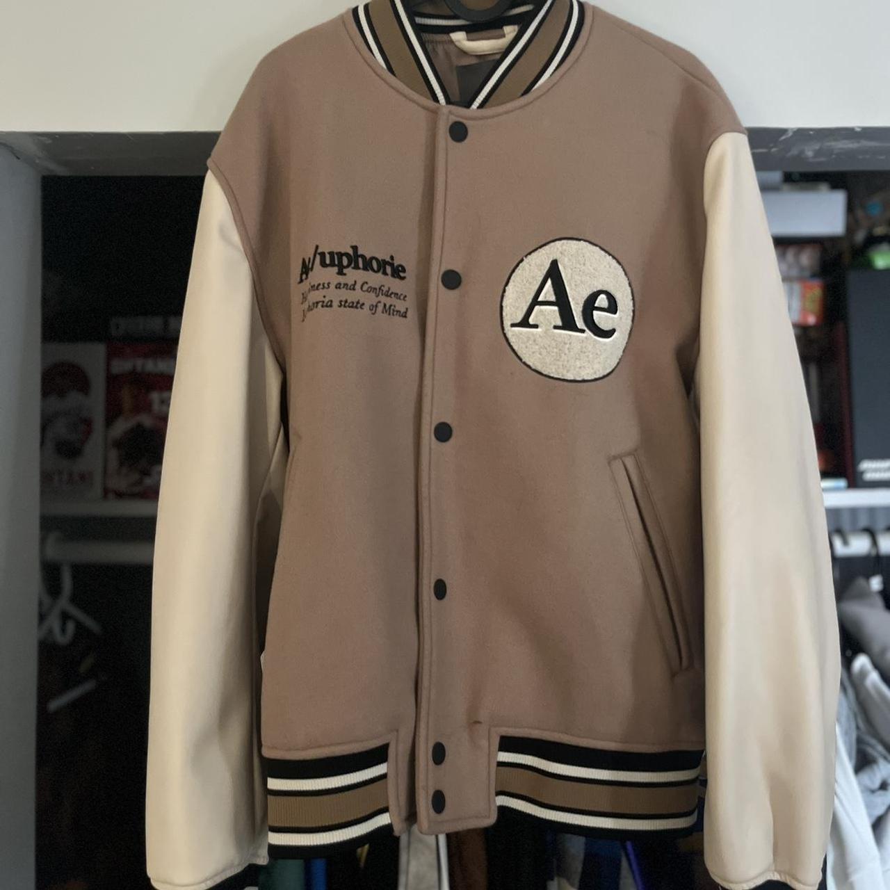 A-Uphorie cream and tan varsity jacket - Depop