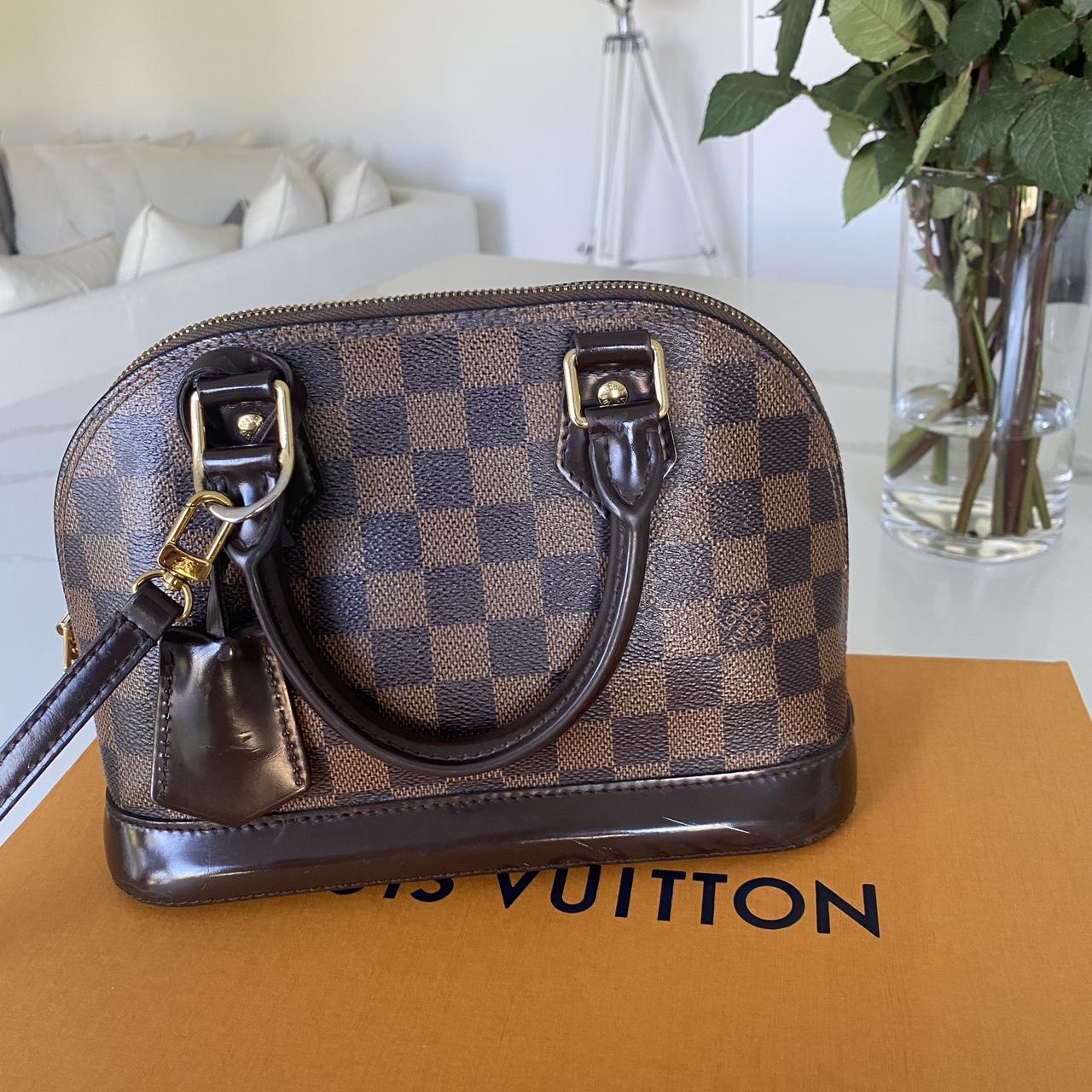 selling my Louis Vuitton Alma BB. Has been used so... - Depop