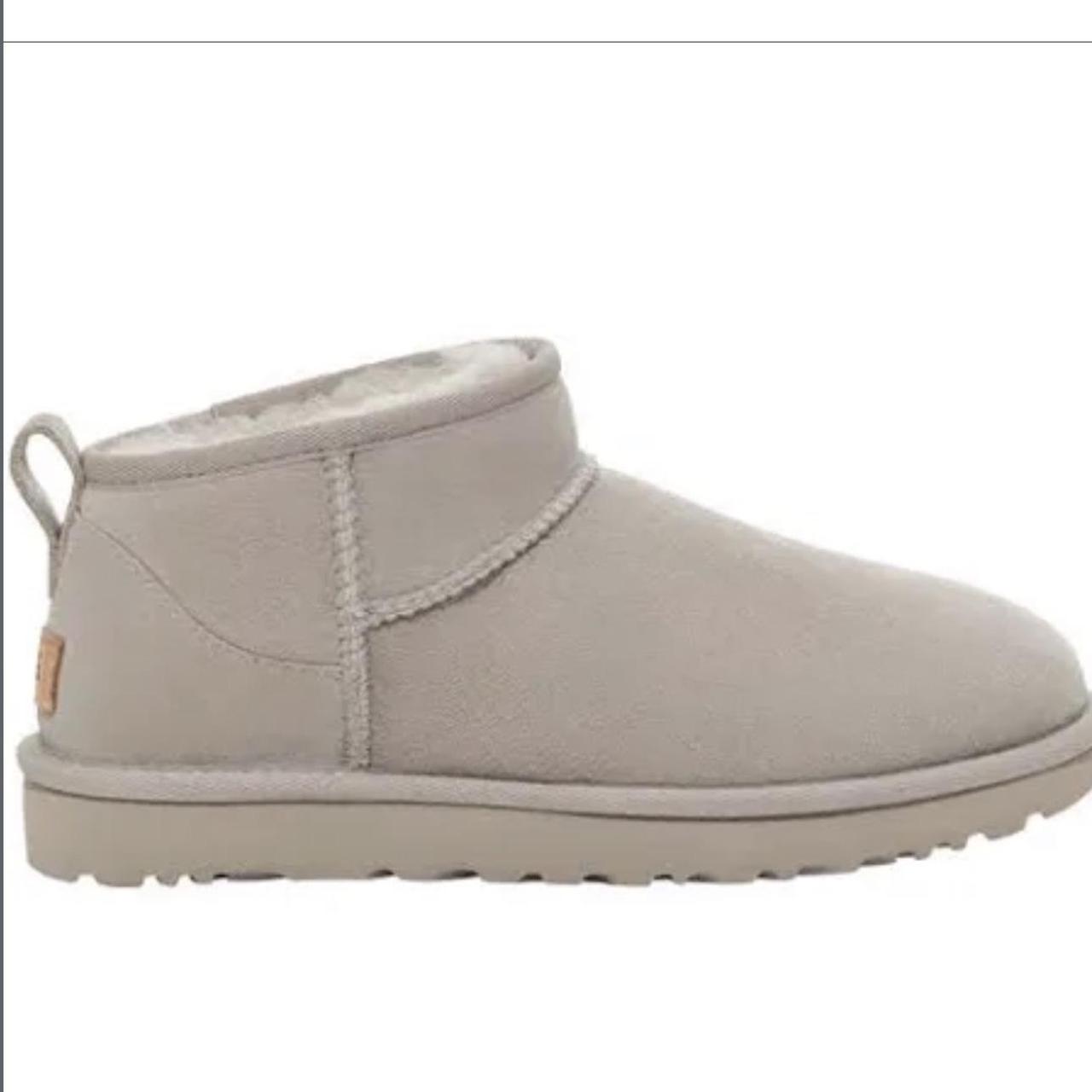Light grey mini uggs worn once. Small little scuff... - Depop