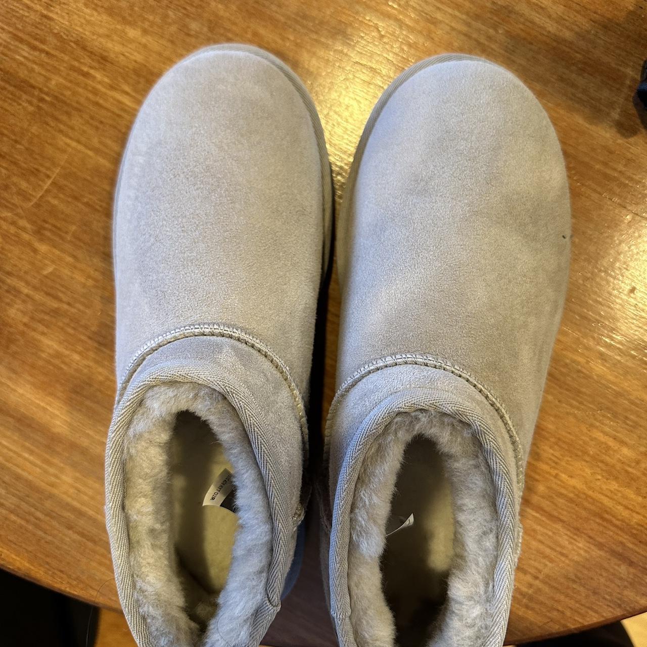 Light grey mini uggs worn once. Small little scuff... - Depop