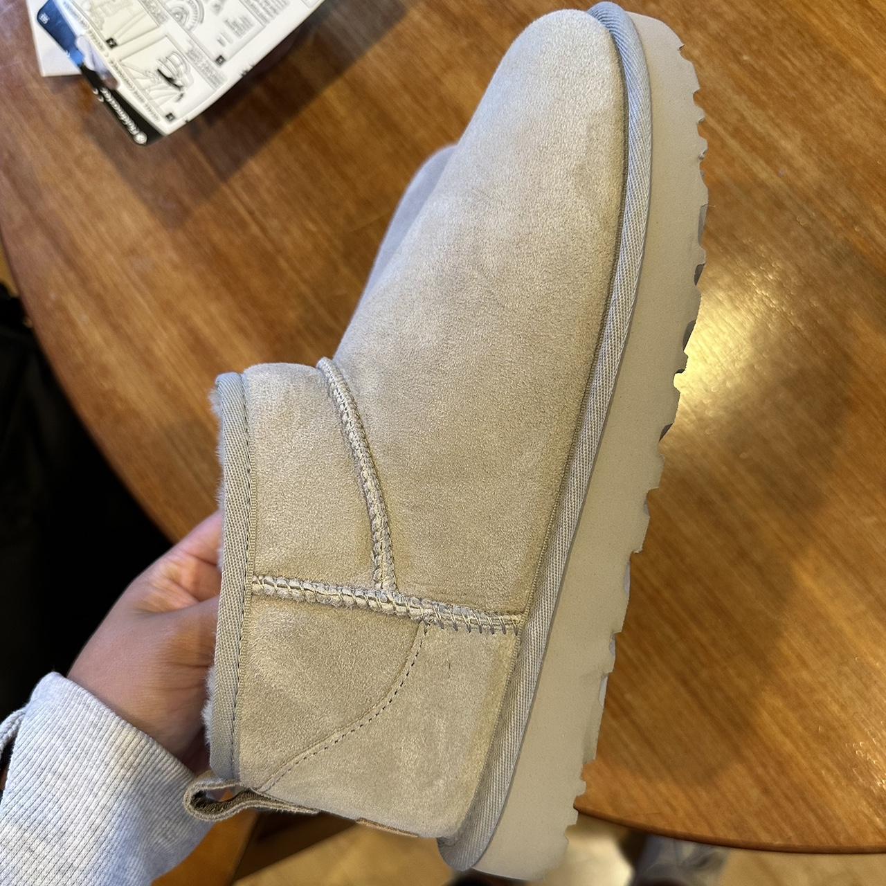 Light grey mini uggs worn once. Small little scuff... - Depop
