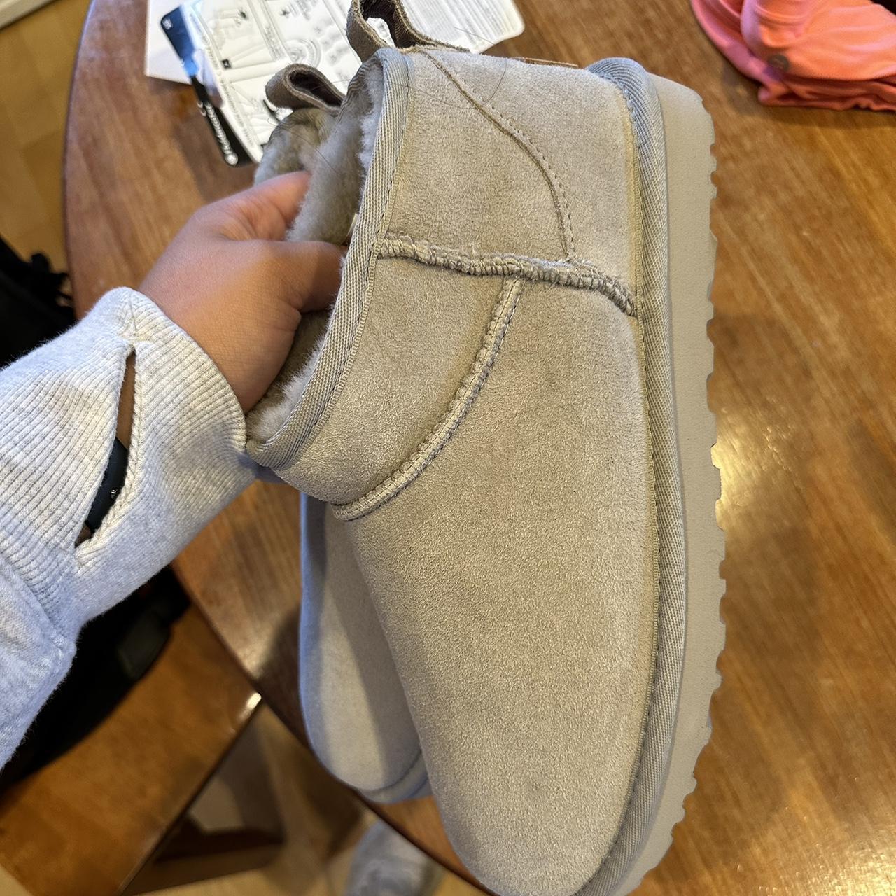 Light grey mini uggs worn once. Small little scuff... - Depop