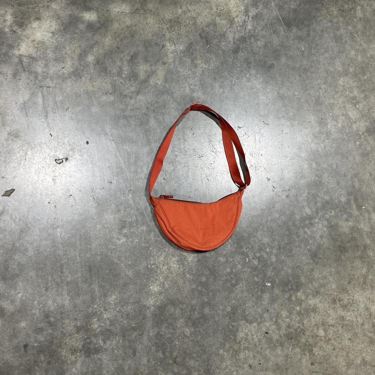 UNIQLO Round Mini Shoulder Bag in Vermillion - Depop