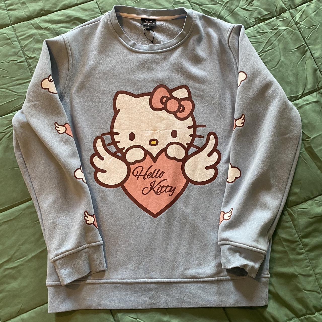 🎄sanrio hello kitty crew neck! 🎄barely worn 🎄fits a... - Depop
